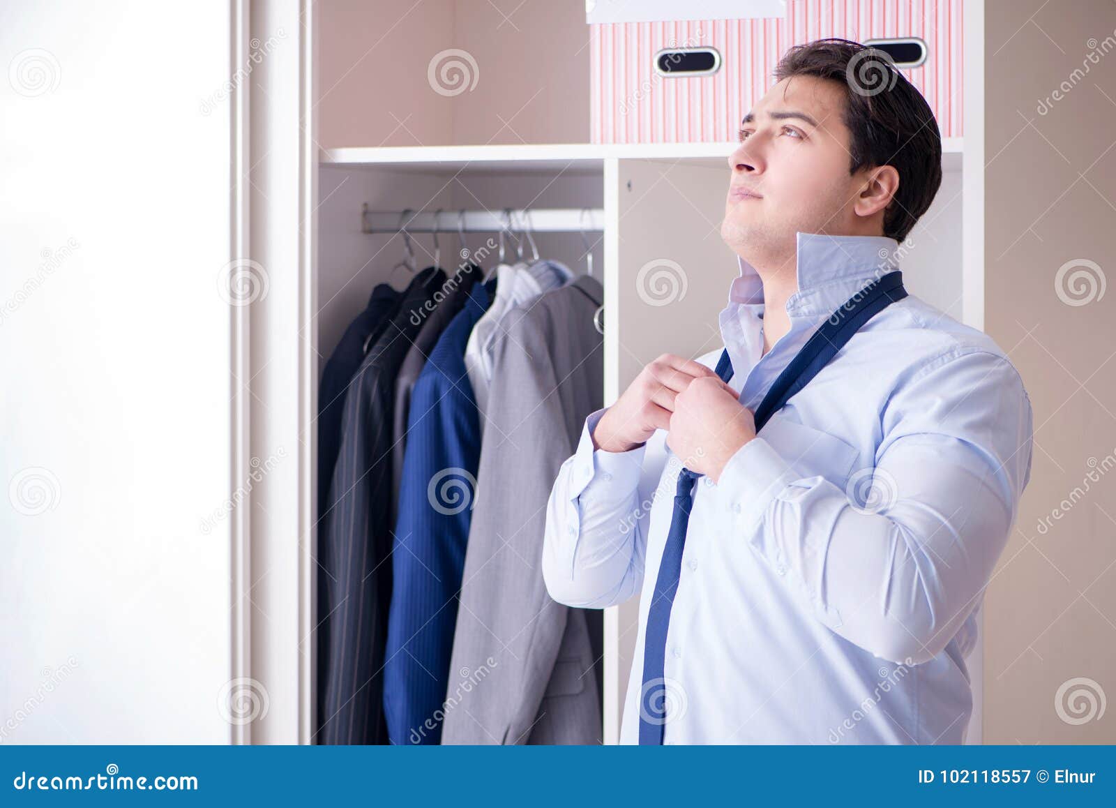 The Young Man Businessman Getting Dressed for Work Stock Image - Image ...
