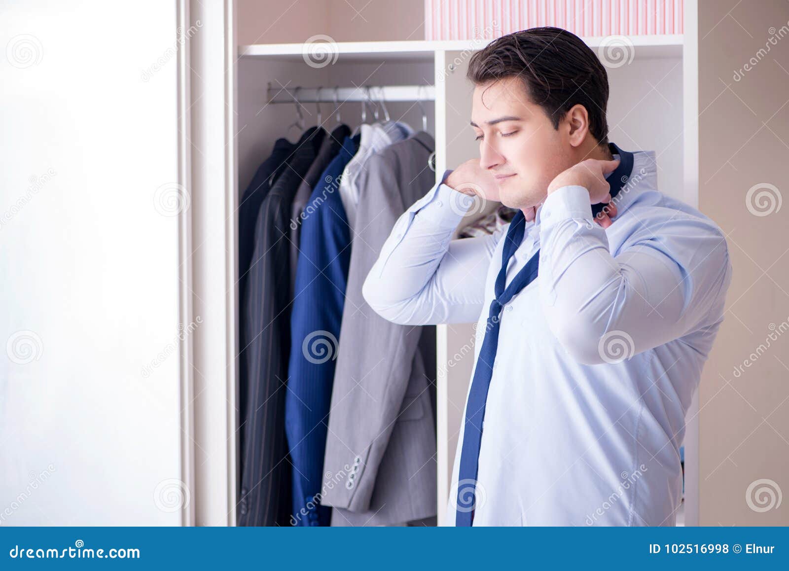 The Young Man Businessman Getting Dressed for Work Stock Photo - Image ...