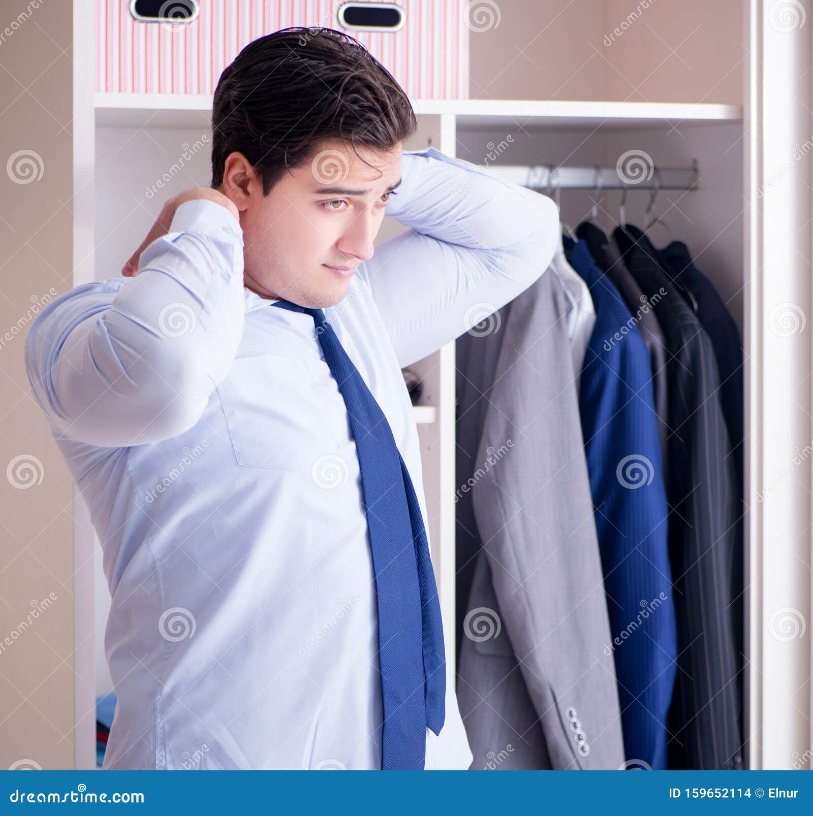 Young Man Businessman Getting Dressed for Work Stock Photo - Image of ...
