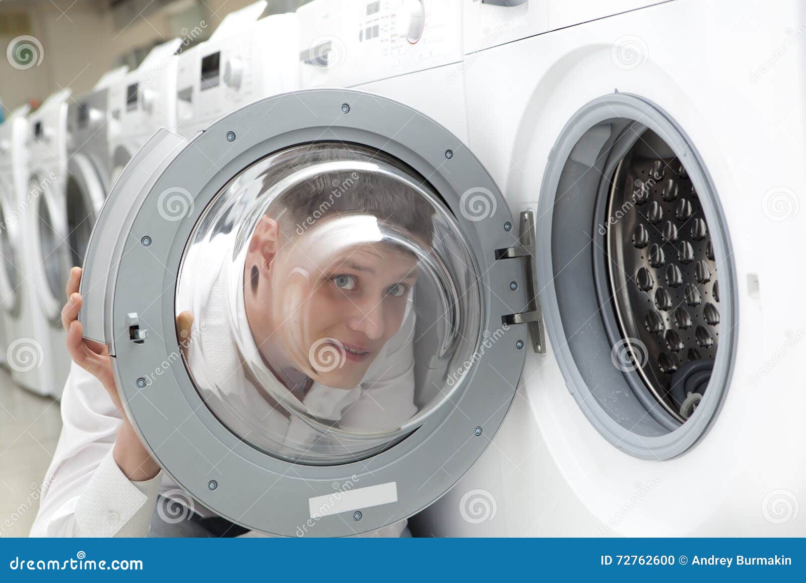 Young Man Buying New Washing Machine Stock Photo - Image of consumer ...