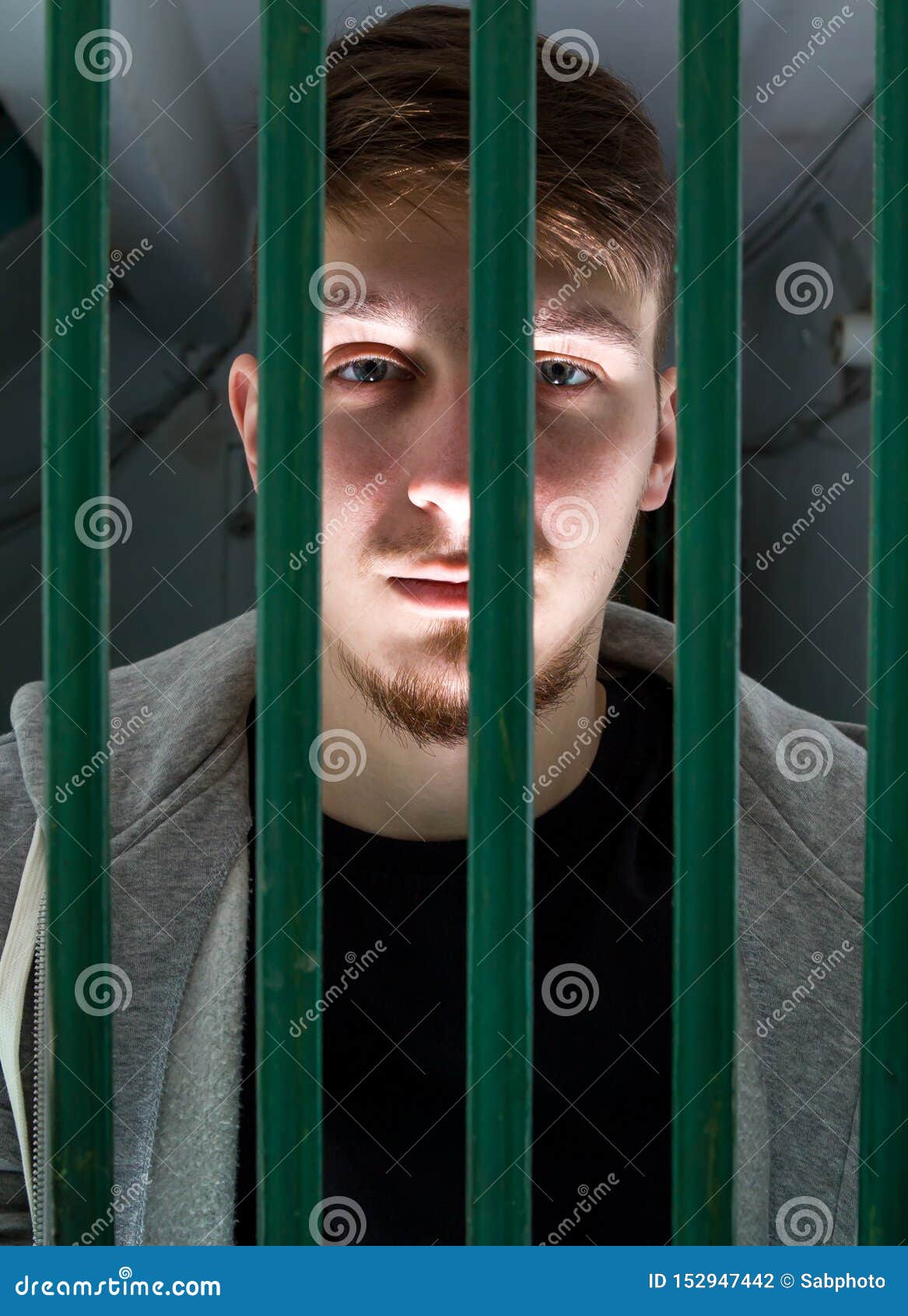 Young Man in a Cage stock photo. Image of male, lock - 152947442