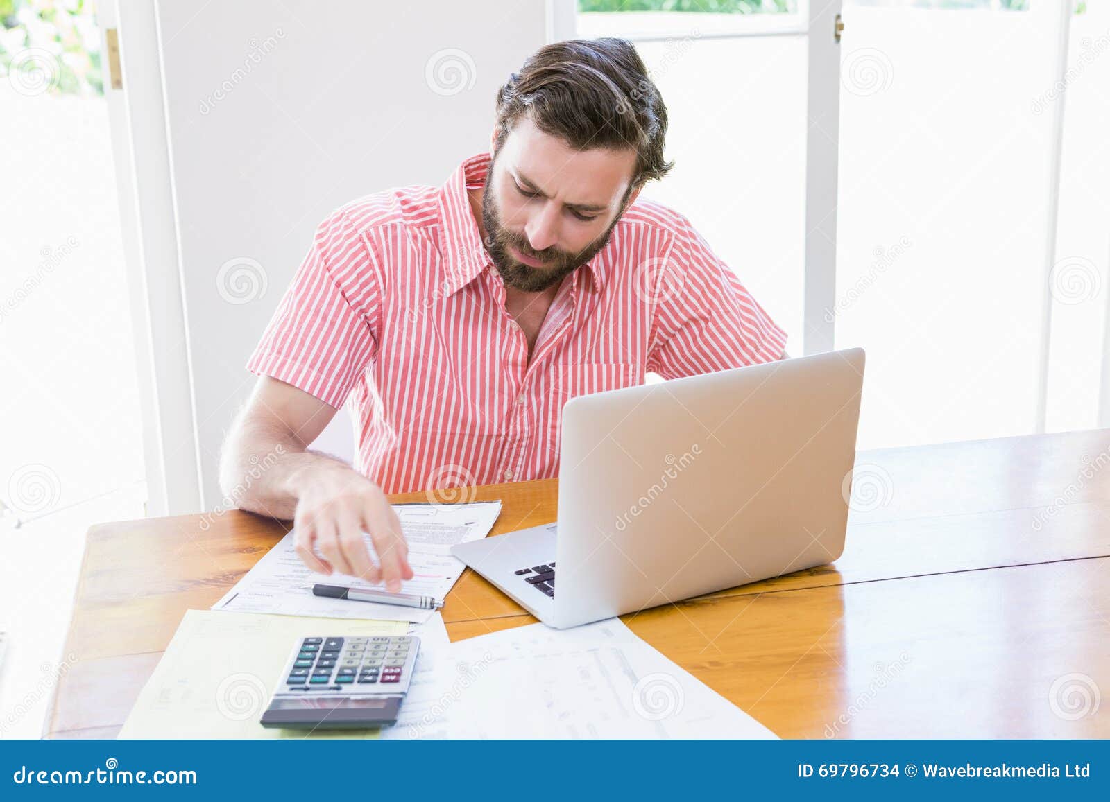 Young Man Calculating His Bills Stock Photo - Image of household, home ...