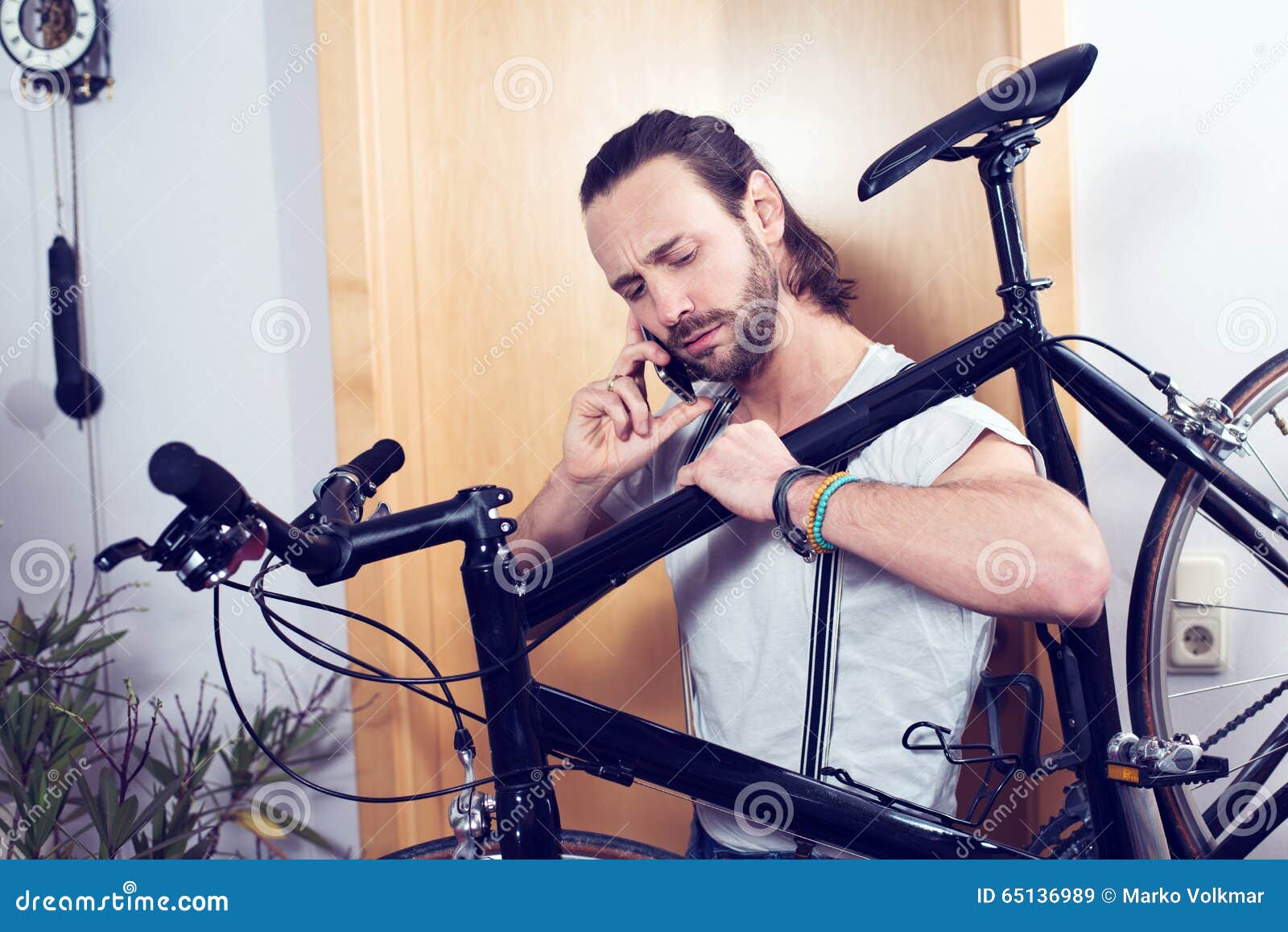 Young Man Calling with Bike on the Shoulder Stock Image - Image of ...