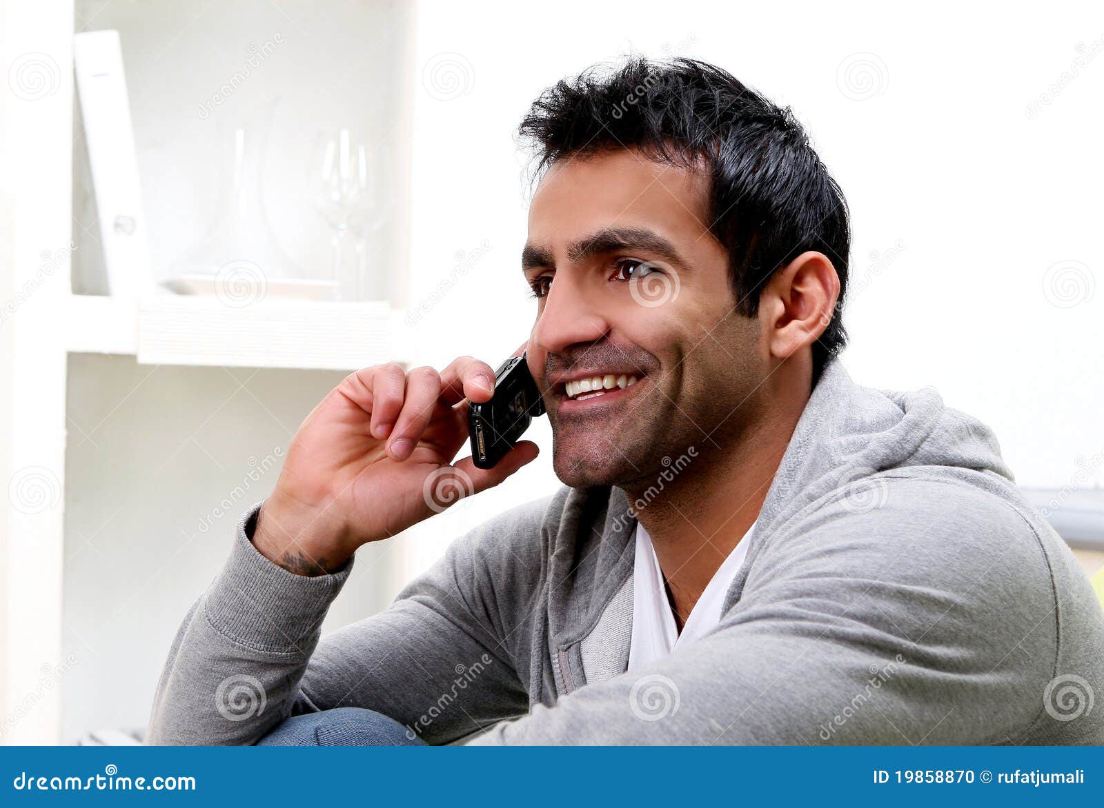 Young man calling by phone stock photo. Image of modern - 19858870