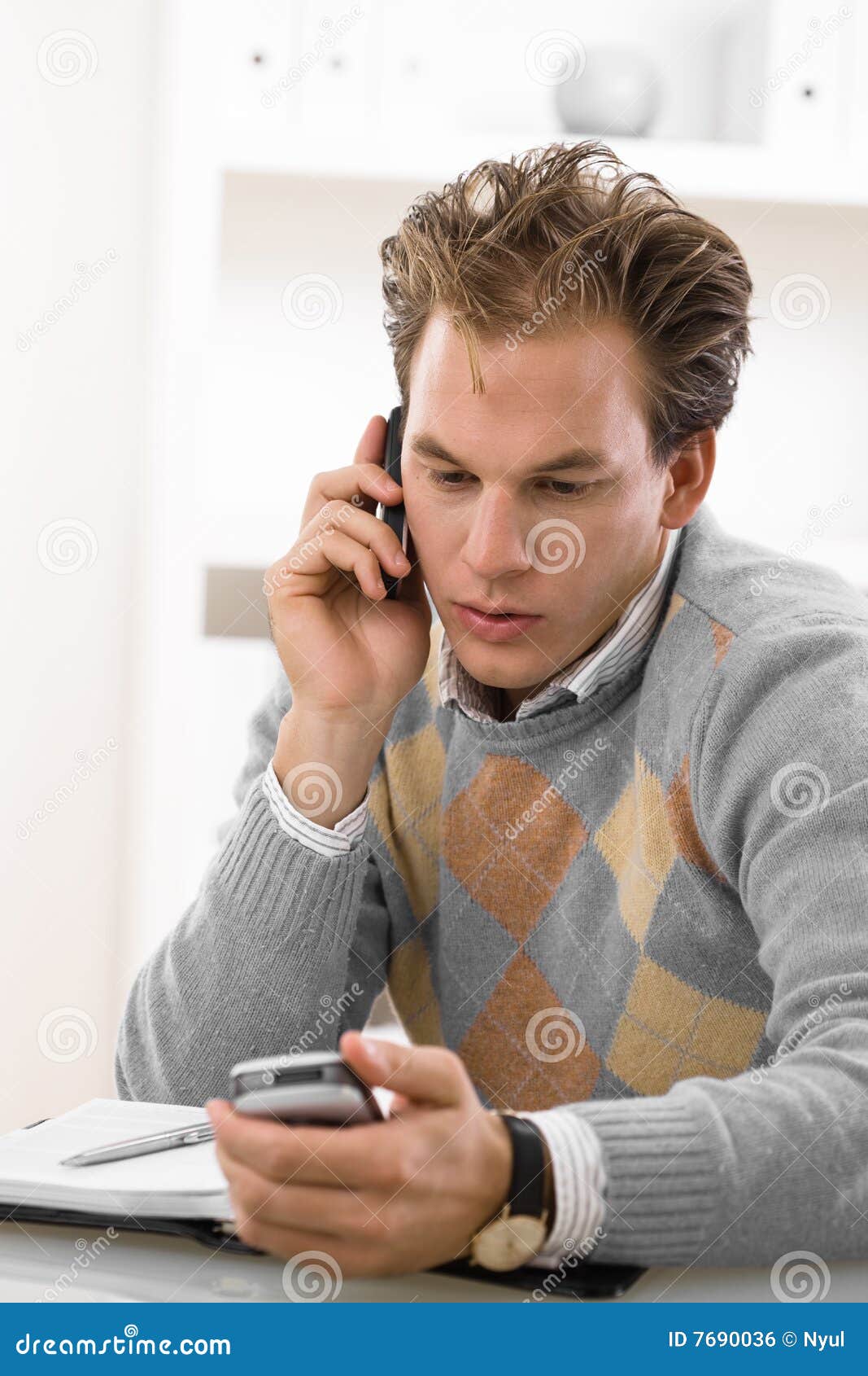 Young man calling on phone stock photo. Image of office - 7690036