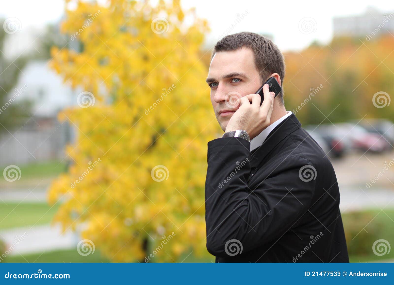 Young Man Calling by Phone in the Street Stock Image - Image of ...
