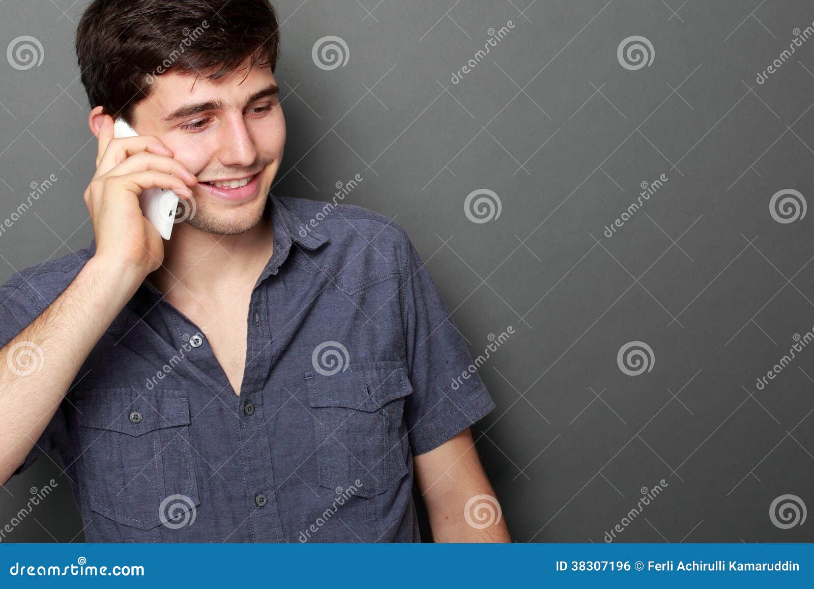 Young man calling by phone stock photo. Image of relax - 38307196