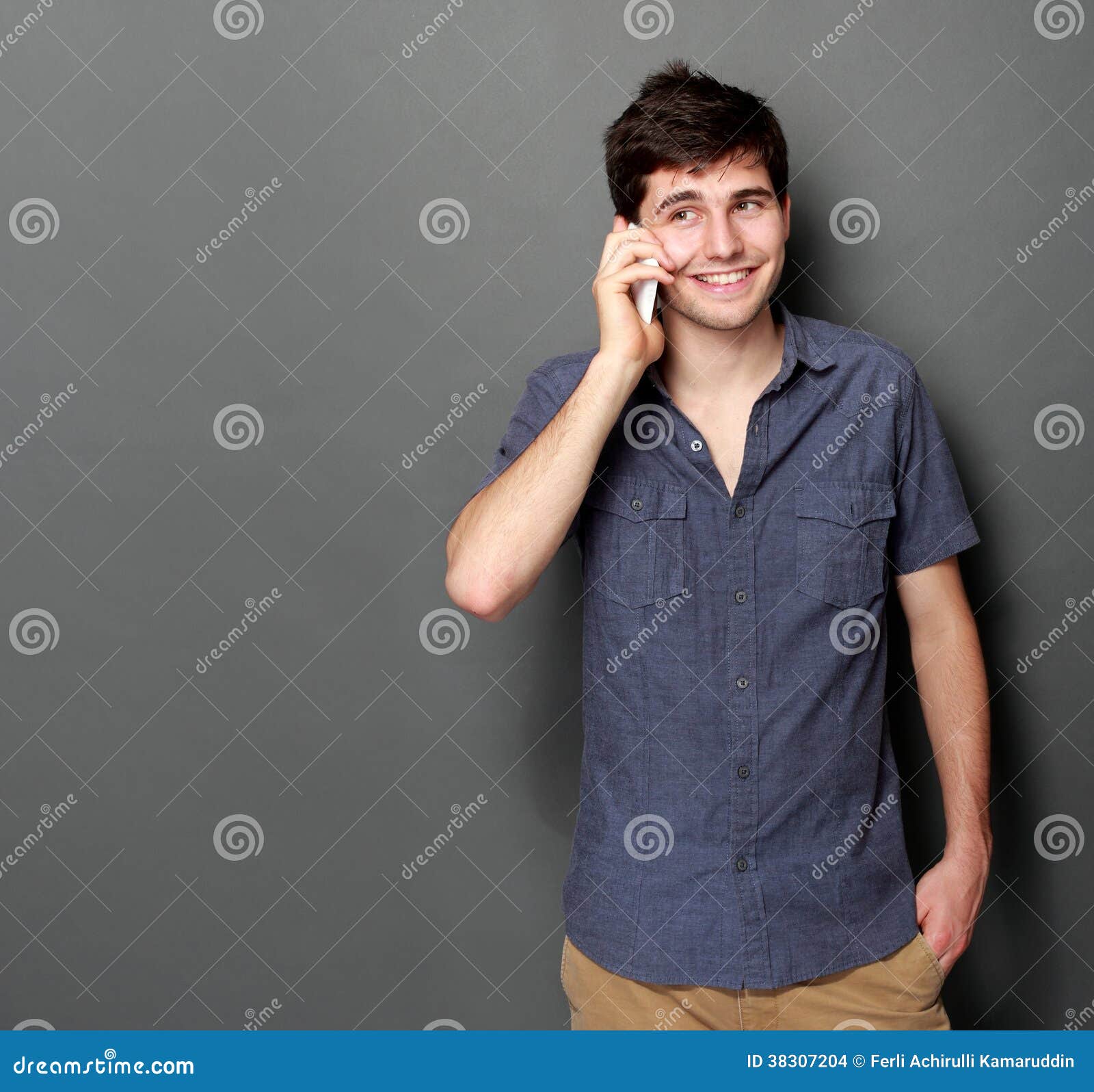 Young man calling by phone stock photo. Image of race - 38307204