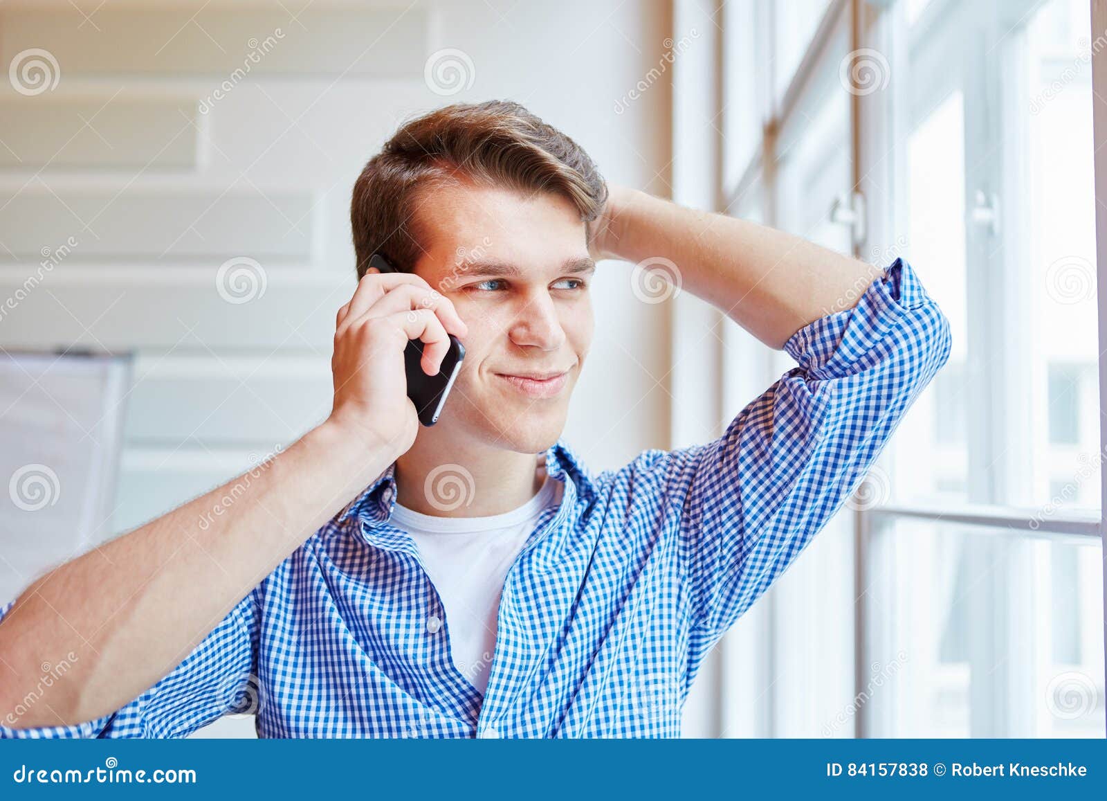 Young Man Calling with Smartphone Stock Photo - Image of calling ...