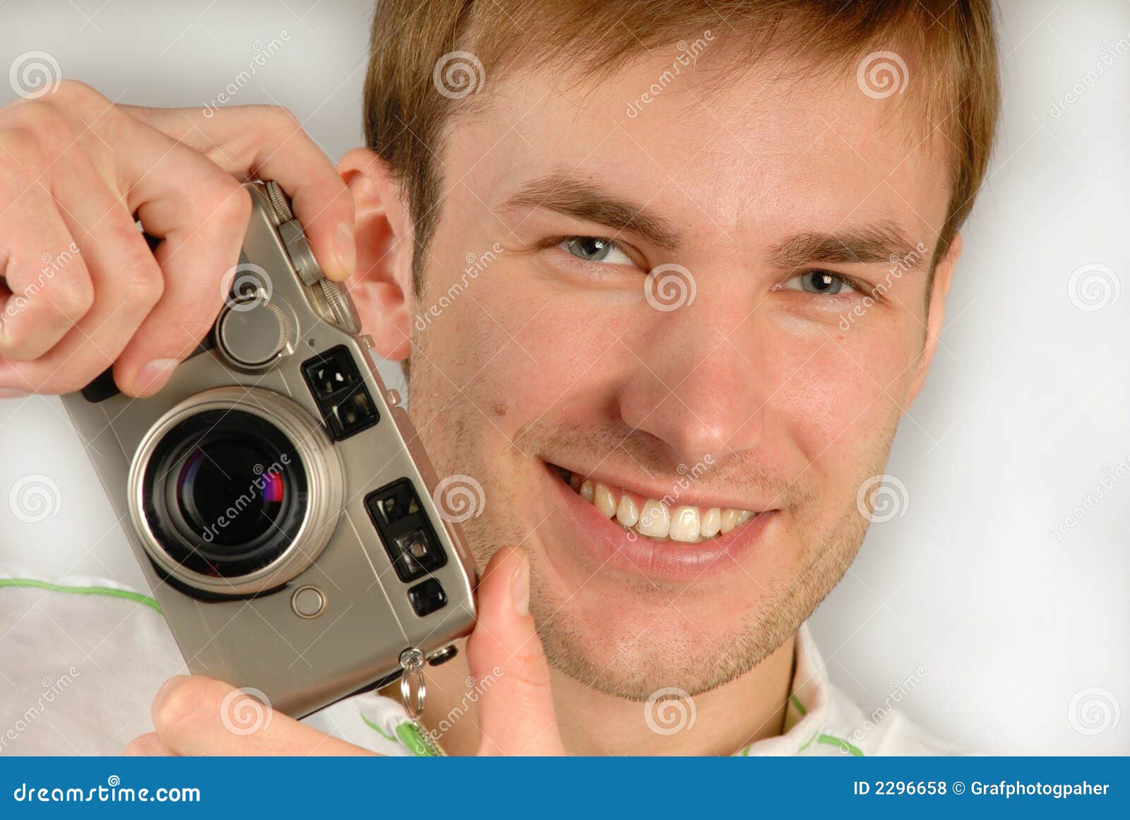 Young man with camera stock photo. Image of photographer - 2296658