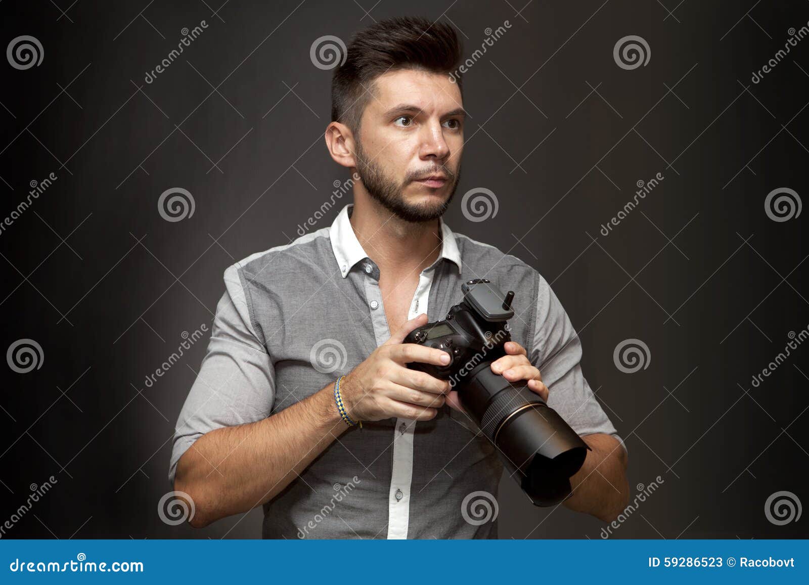 Young man with camera stock image. Image of hand, creativity - 59286523