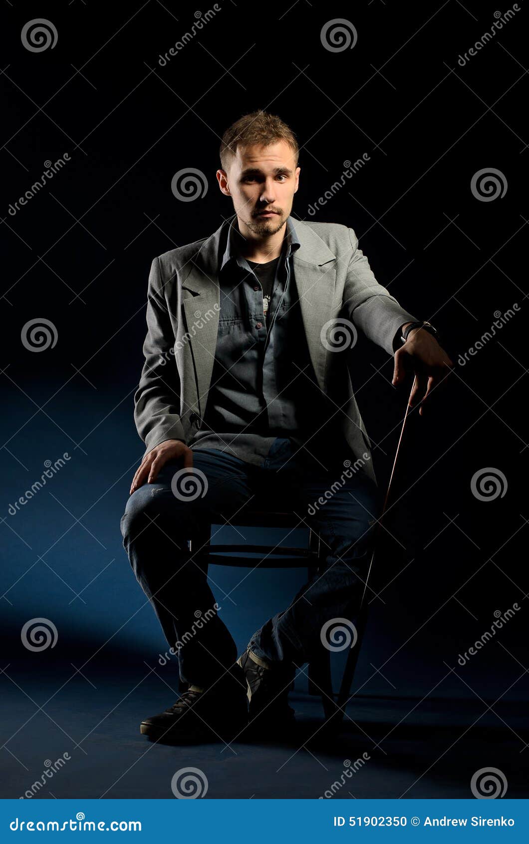 Young Man With Cane Sitting On Chair Stock Photo - Image: 51902350