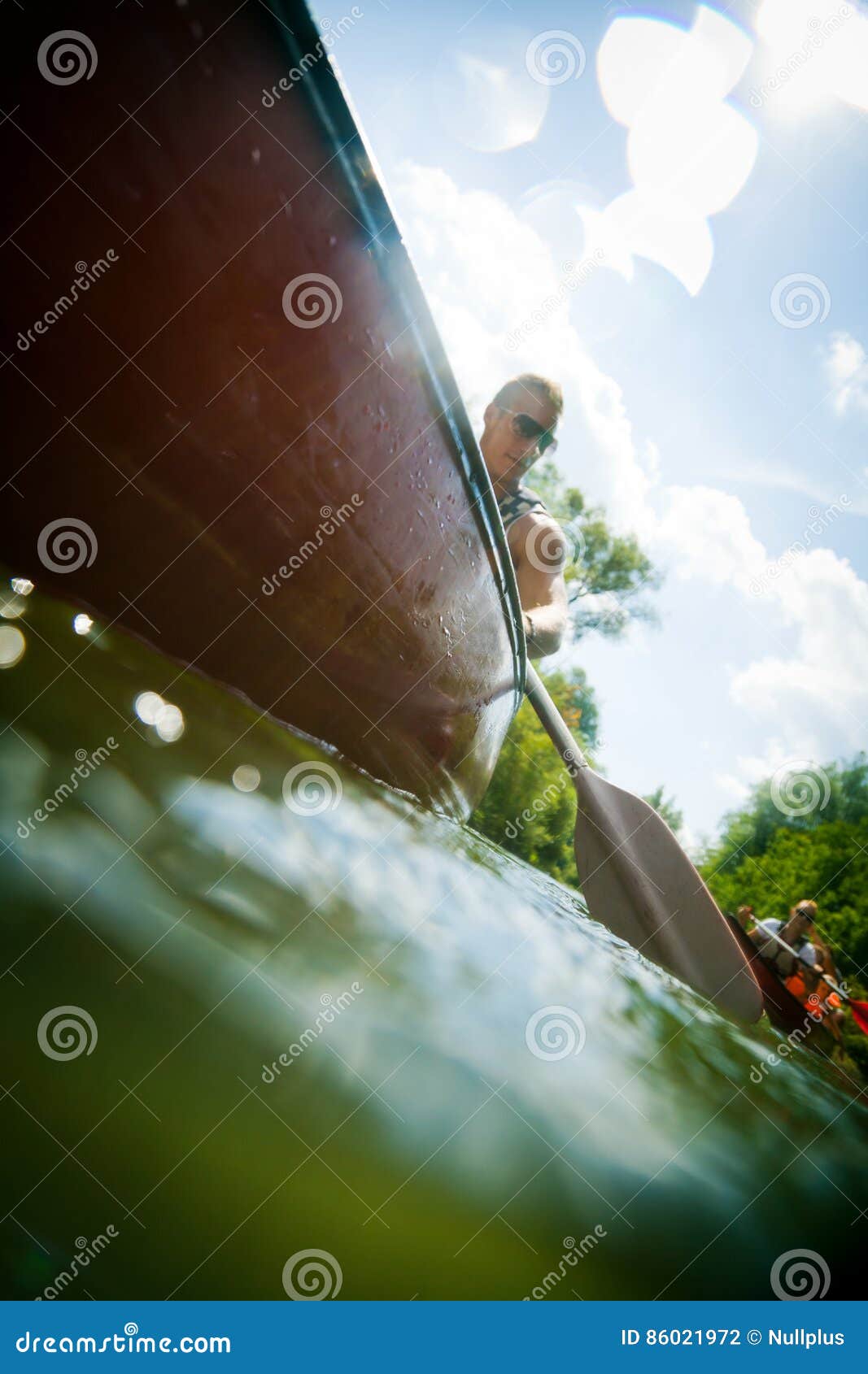 Young Man Canoeing stock photo. Image of enjoyment, male - 86021972