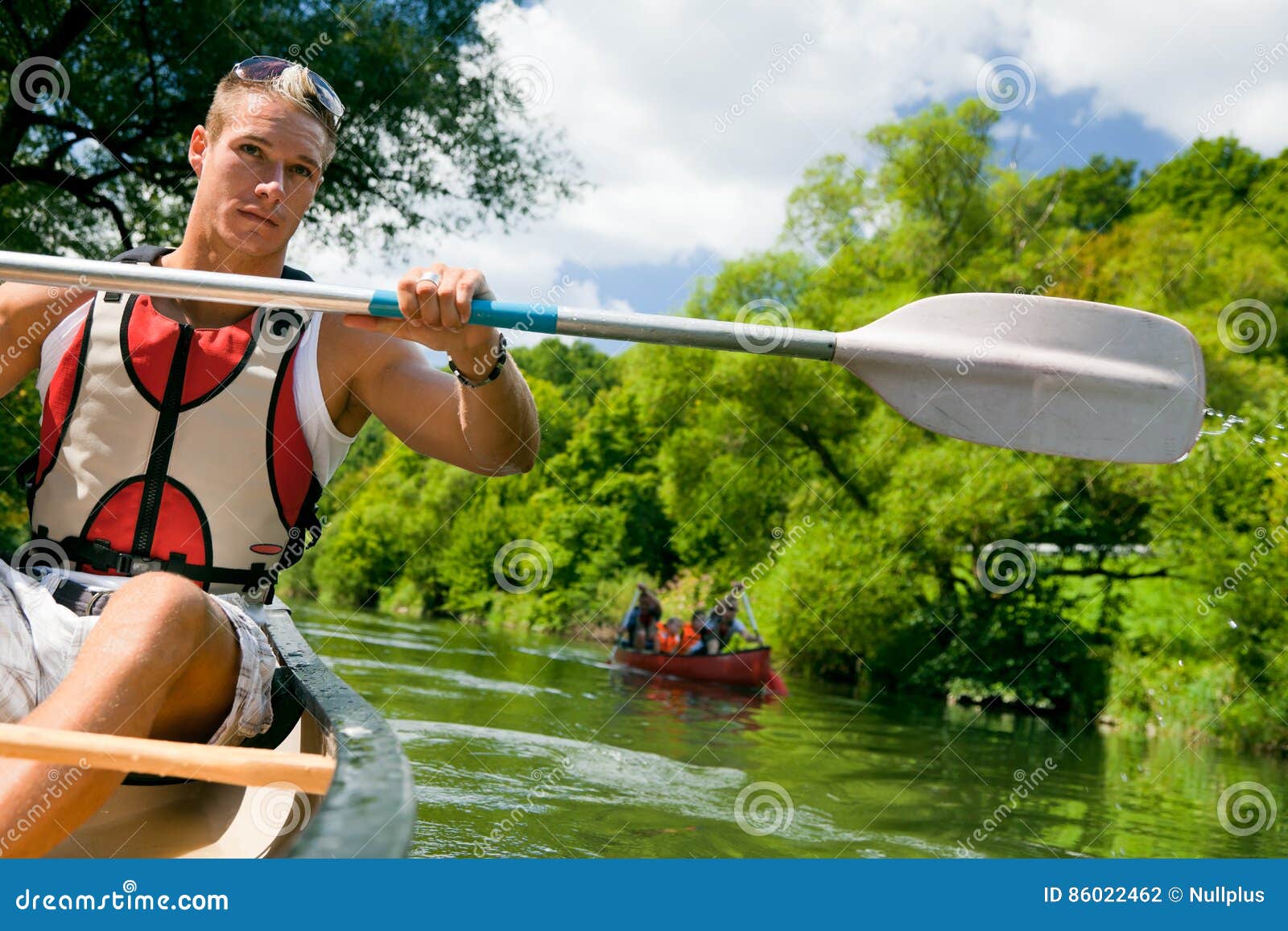Young Man Canoeing stock photo. Image of person, paddling - 86022462