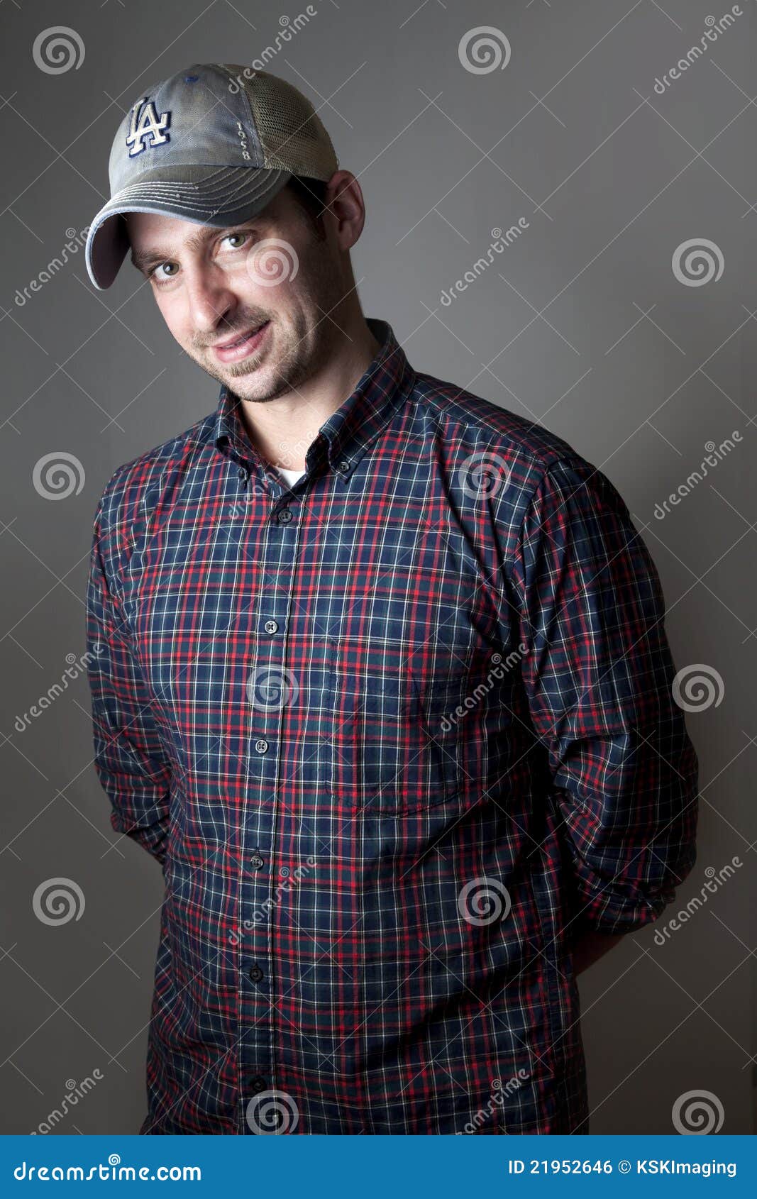 Young Man with a Cap stock photo. Image of view, serious - 21952646