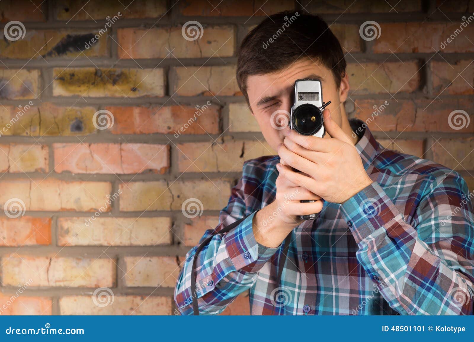 Young Man Capturing Something Using Camera Stock Image - Image of ...