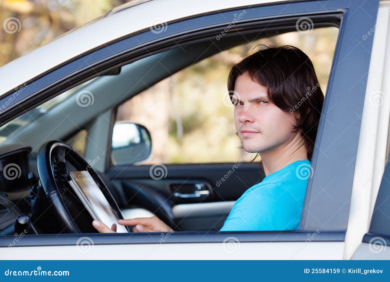 Young man in car stock image. Image of interior, showing - 25584159
