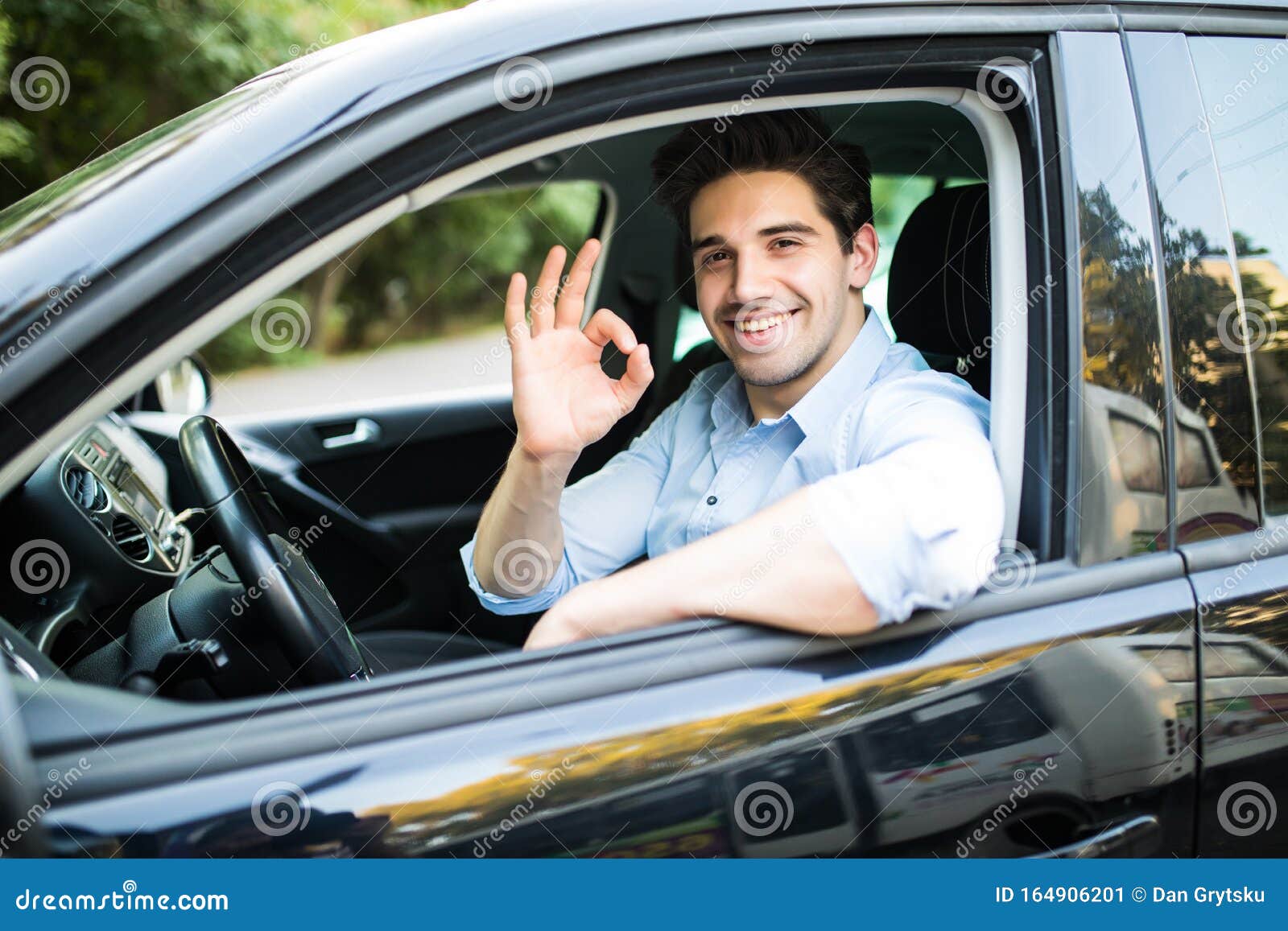 Young Man in His Car Showing Okay Sign Stock Image - Image of looking ...