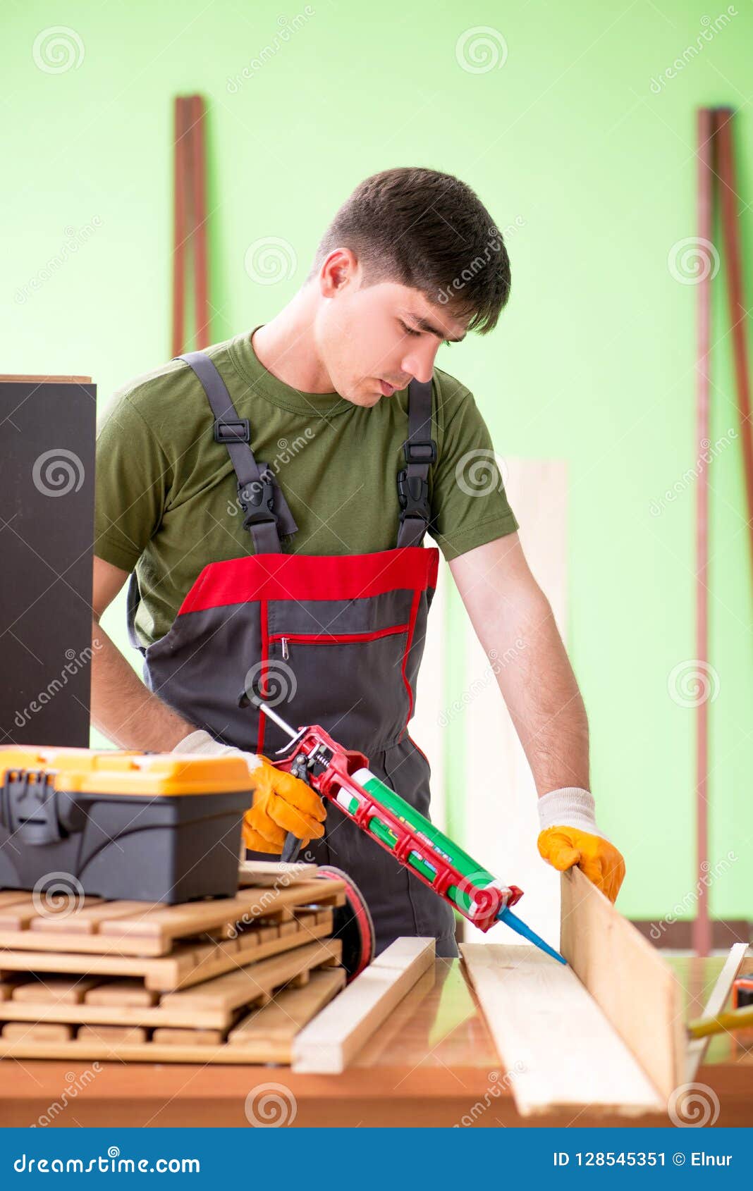 The Young Man Carpenter Working in Workshop Stock Image - Image of ...