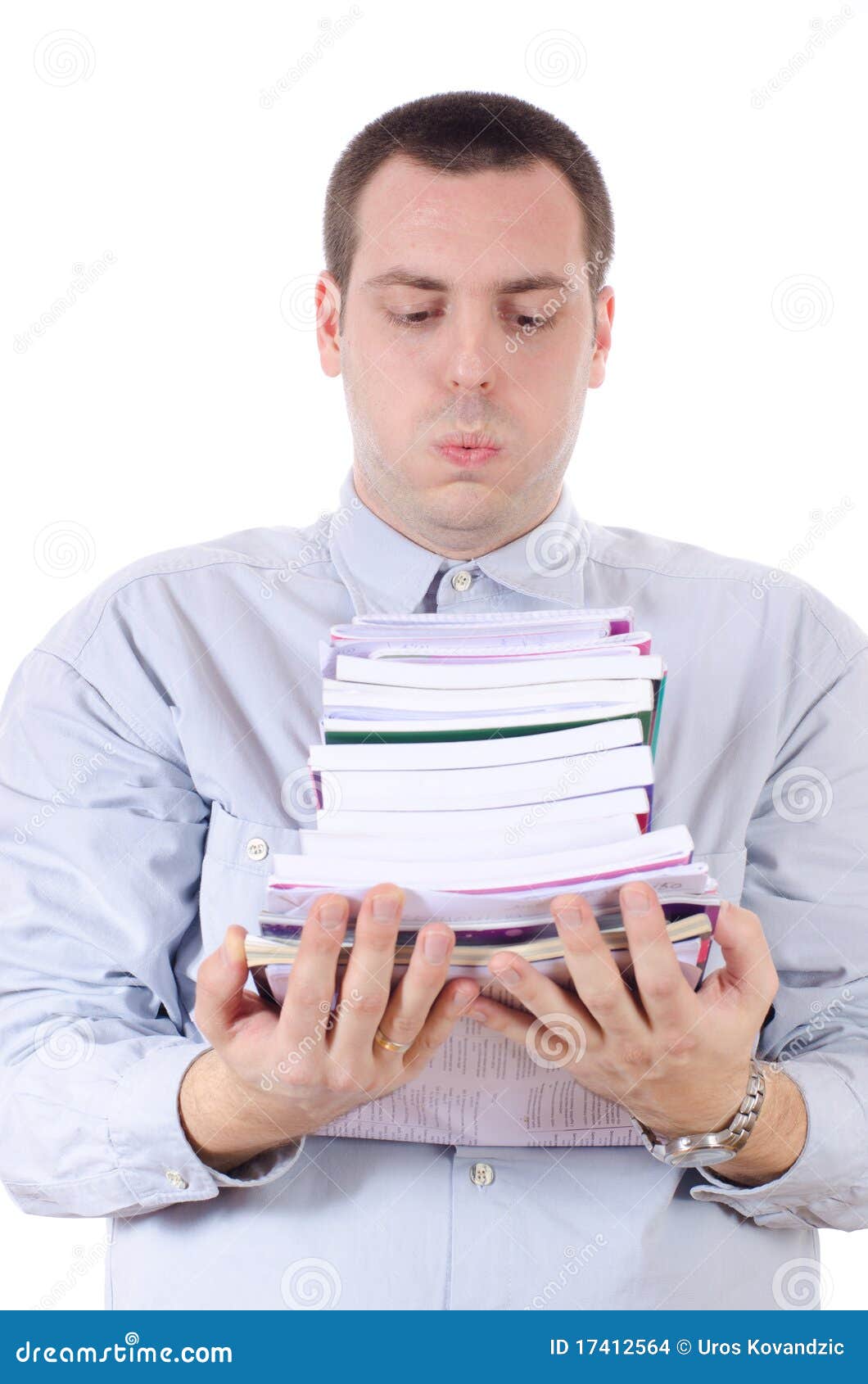 Young Man Carrying a Stack of Books Stock Photo - Image of jacket ...