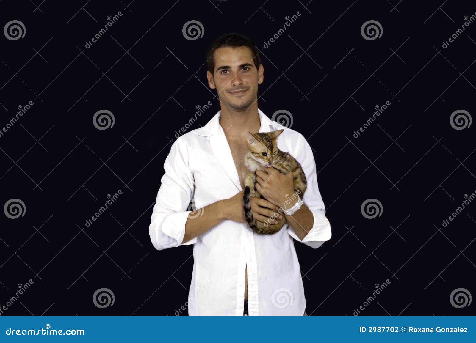 Young man with a cat pet stock photo. Image of owner, cats - 2987702