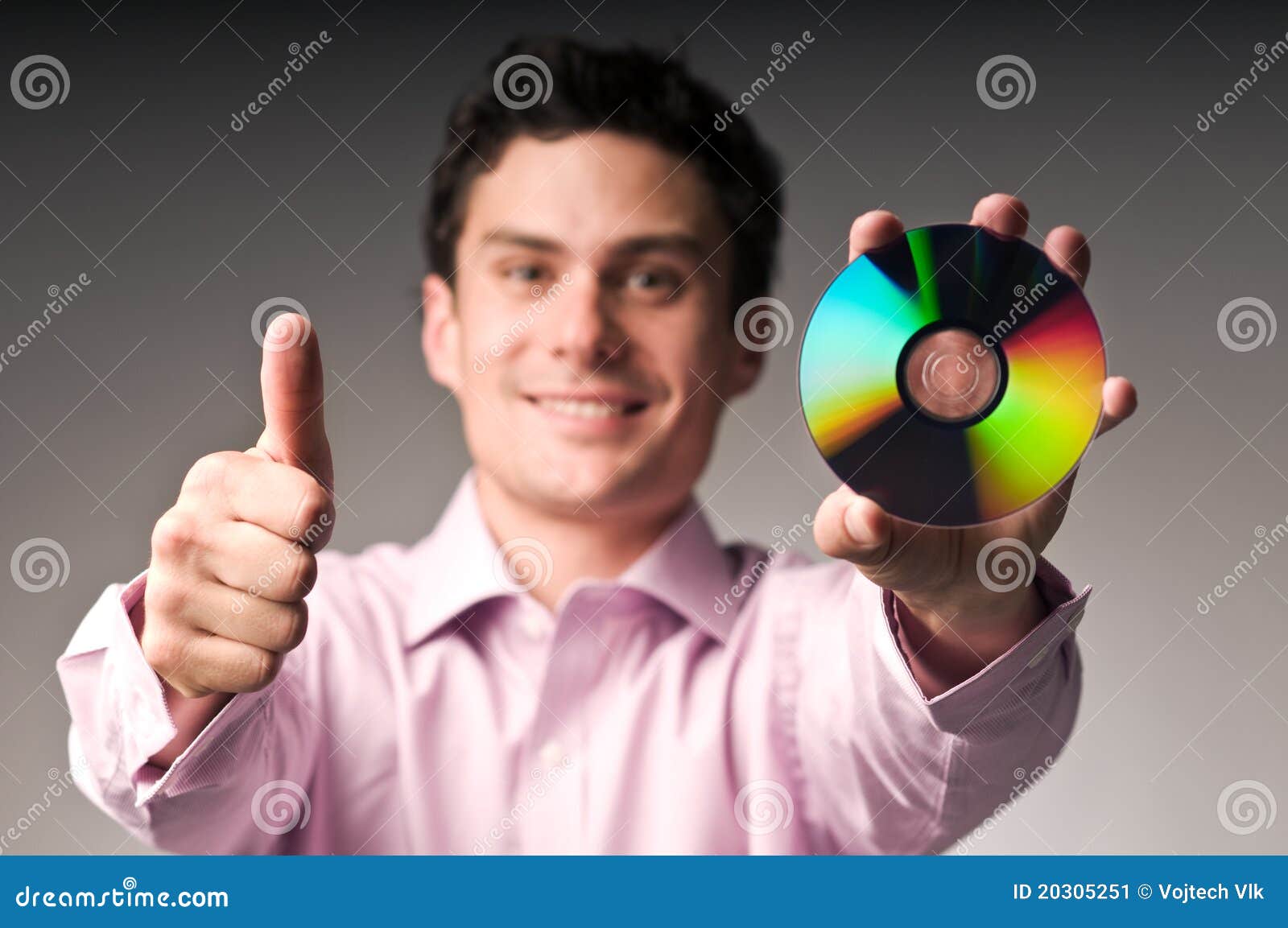 Young Man with CD stock image. Image of data, youth, small - 20305251