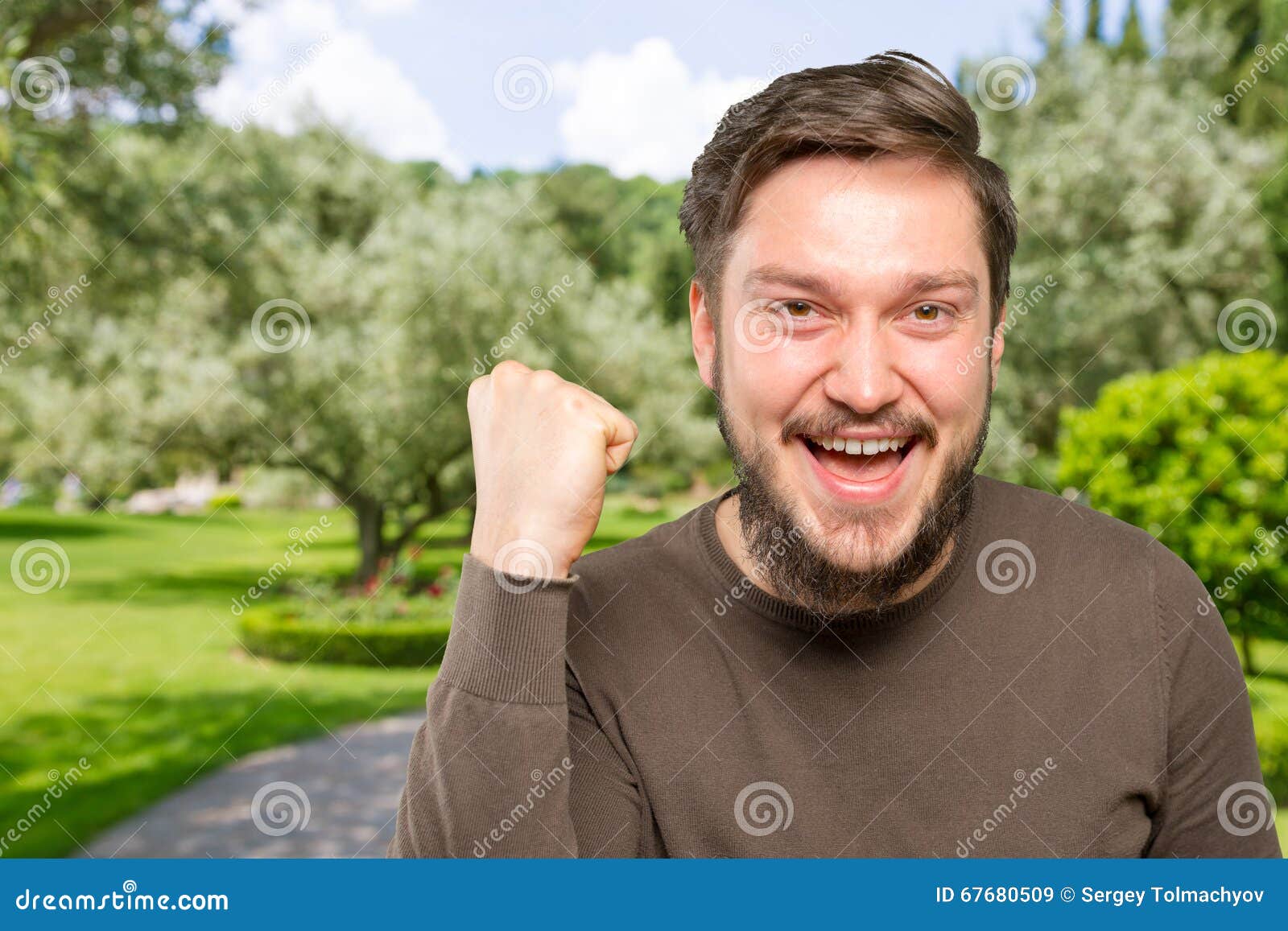 Young man celebrating stock image. Image of light, modern - 67680509