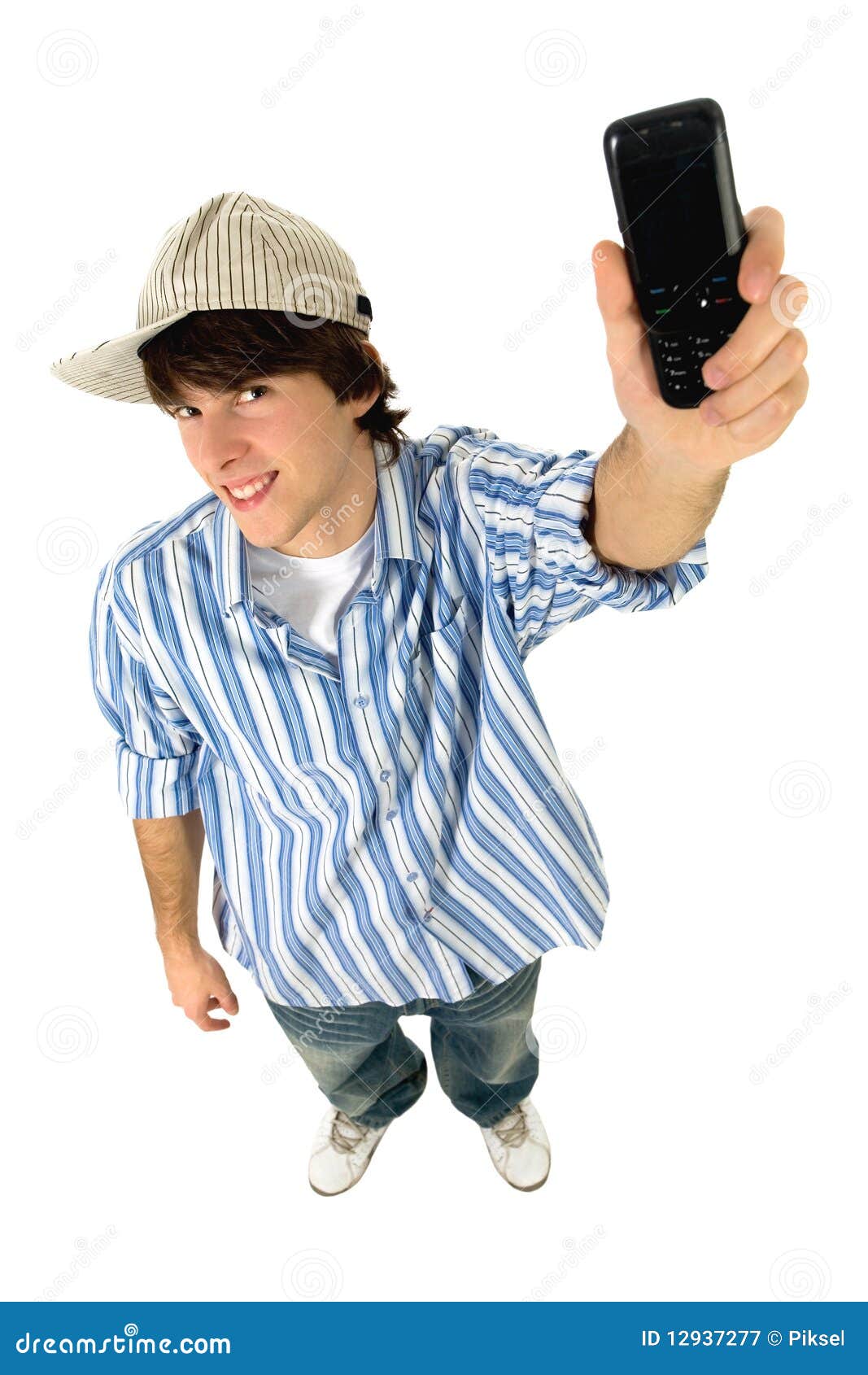 Young man with cell phone stock image. Image of mobile - 12937277