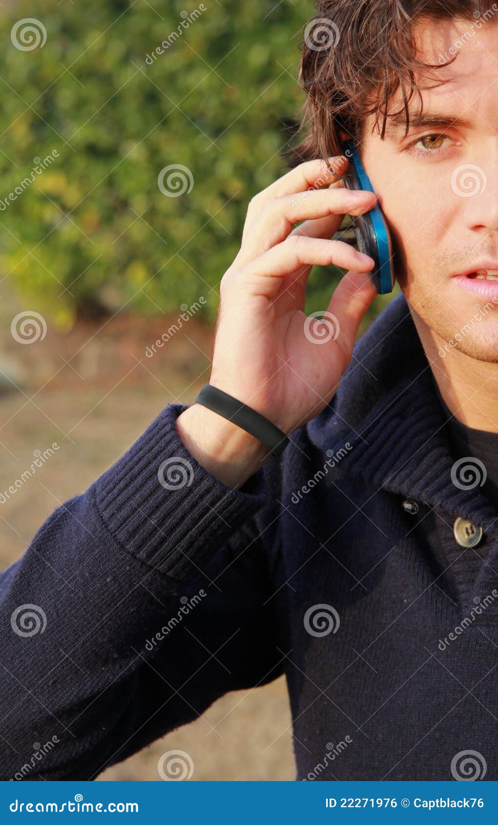 Young man with cell phone stock photo. Image of looking - 22271976