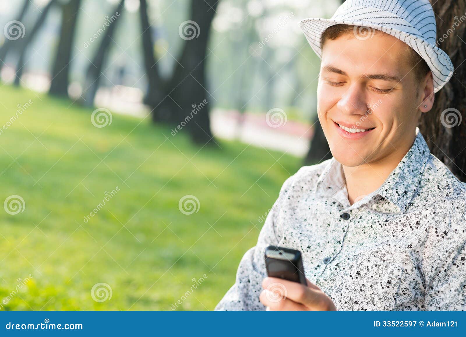 Young Man with a Cell Phone Stock Image - Image of adult, businessman ...