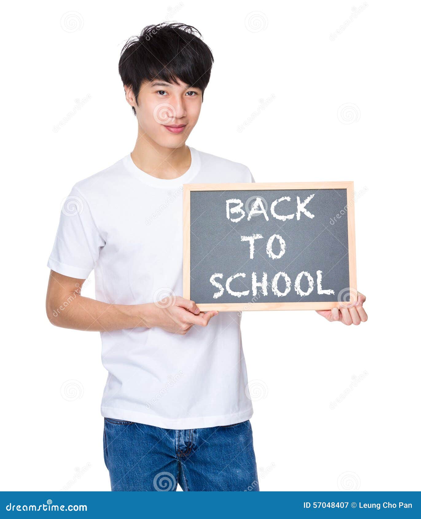 Young Man with Chalkboard Showing Back To School Message Stock Image ...