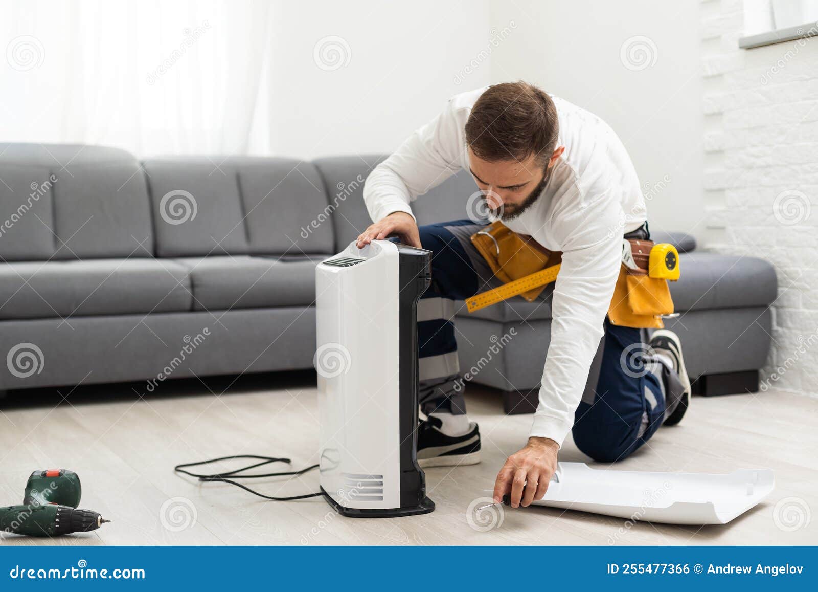 Young Man Changing - Fixing a Dirty Air Purifier HEPA Filter after ...