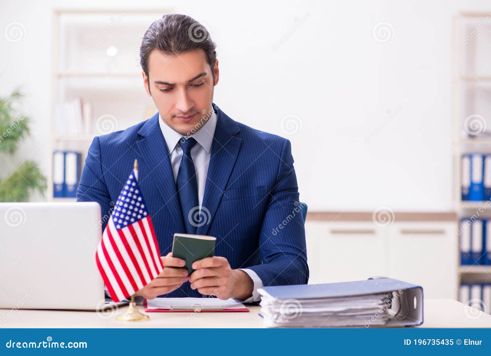 Young Man Checking Passport at USA Embassy Stock Image - Image of ...