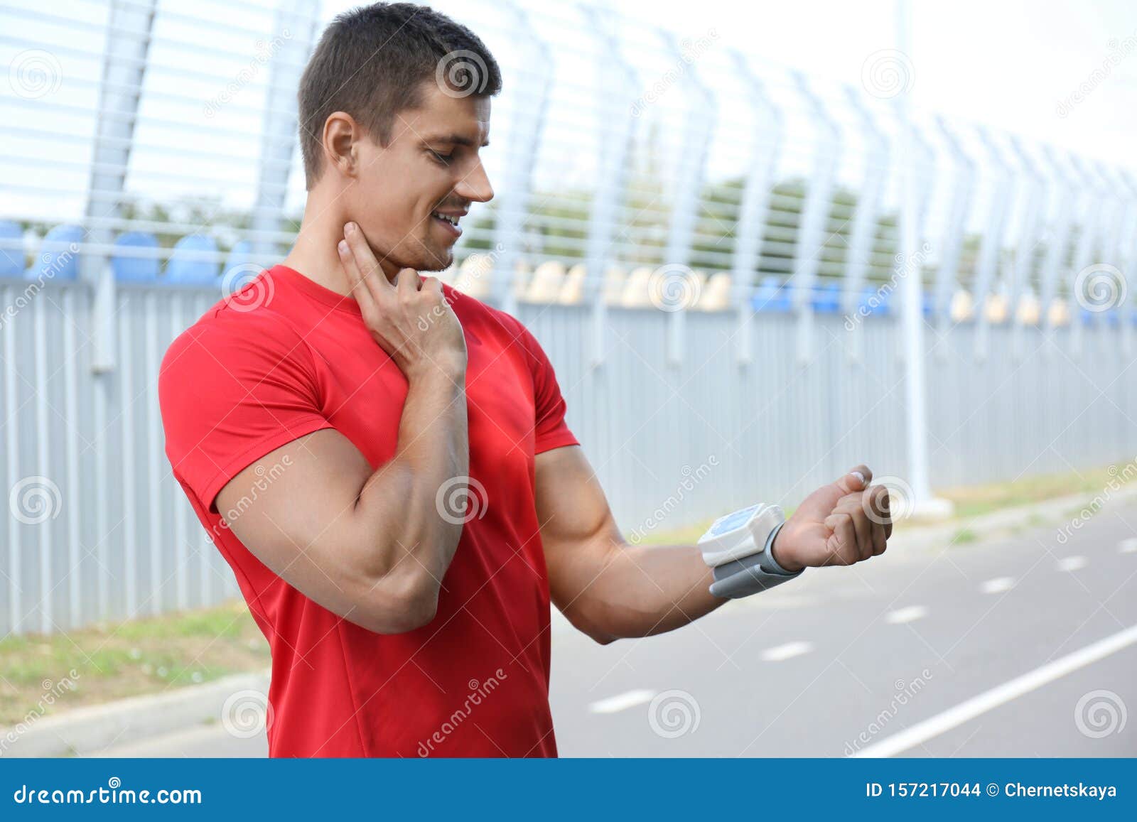 Young Man Pulse with Medical Device after Training. Space for Text ...