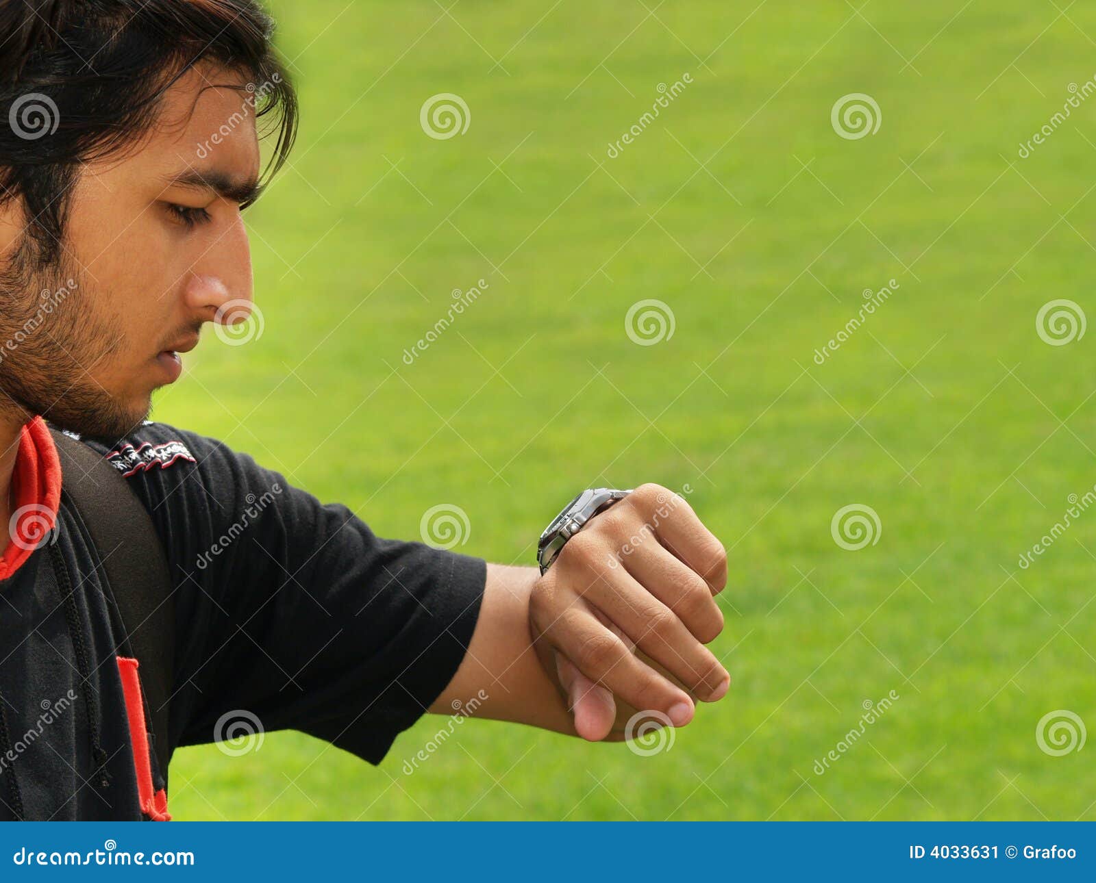 Young Man Checking the Time Stock Image - Image of model, asian: 4033631