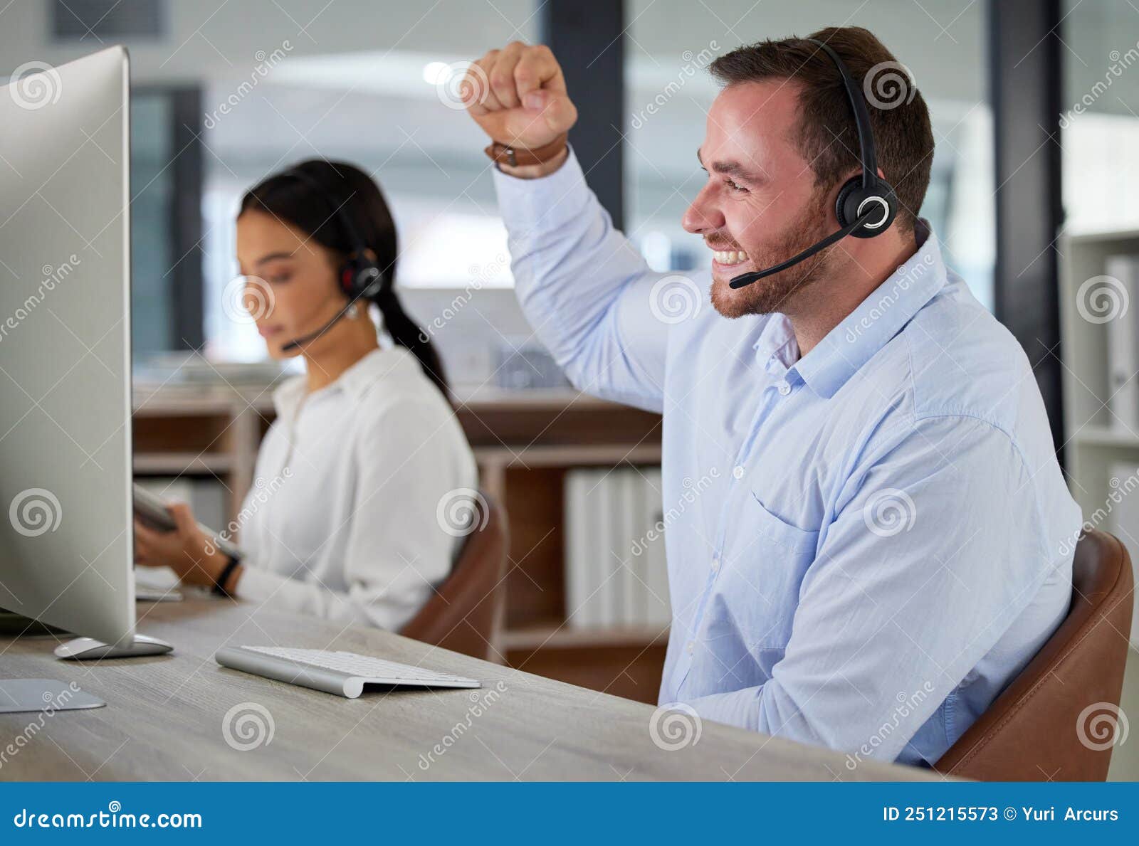 Thats What I Love To Hear. a Young Man Cheering while Using a Computer ...
