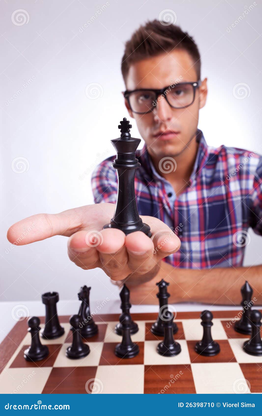 Chess Player Achieving Success. Surreal And Conceptual Scene Of A Tiny ...