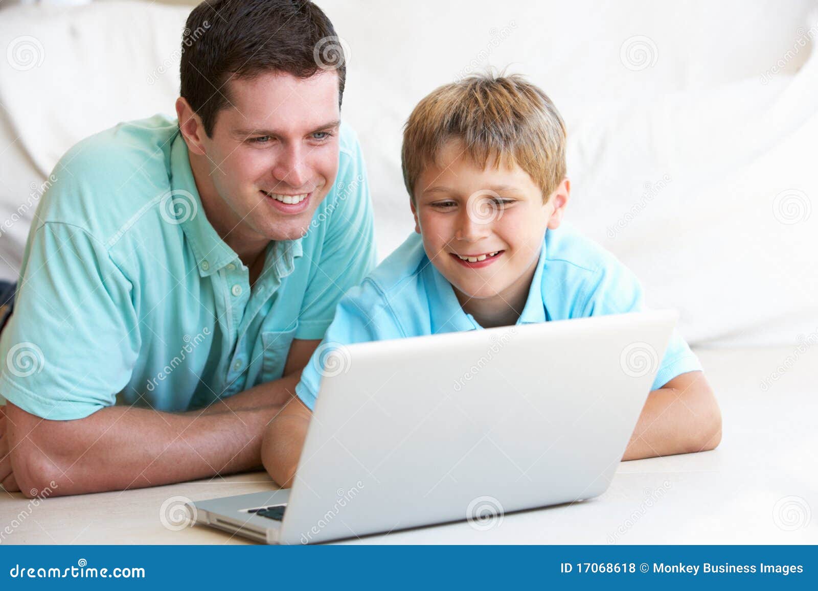 Young Man with Child on Laptop Computer Stock Photo - Image of father ...