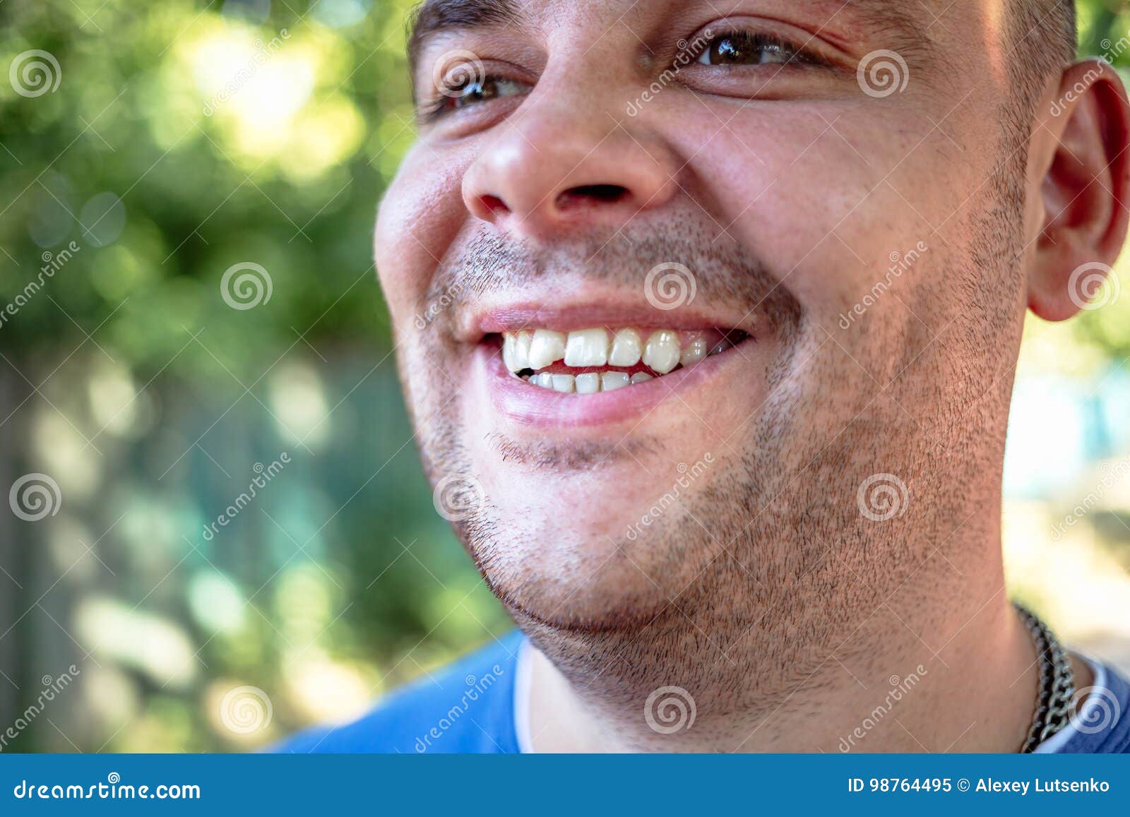 Young Man with a Chipped Tooth Stock Image - Image of fist, grin: 98764495