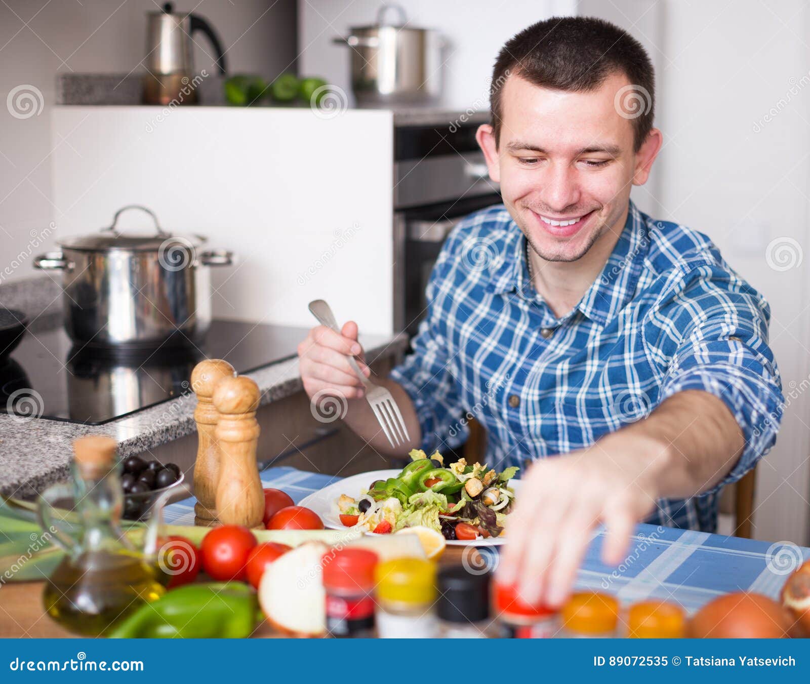 Young Man Chooses Spices in Kitchen at Home Stock Image - Image of ...