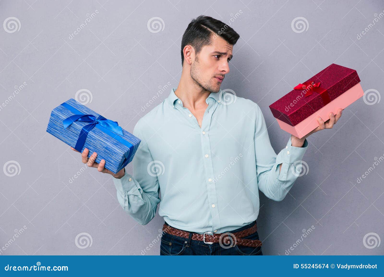 Young Man Choosing Two Gift Box Stock Photos - Free & Royalty-Free ...
