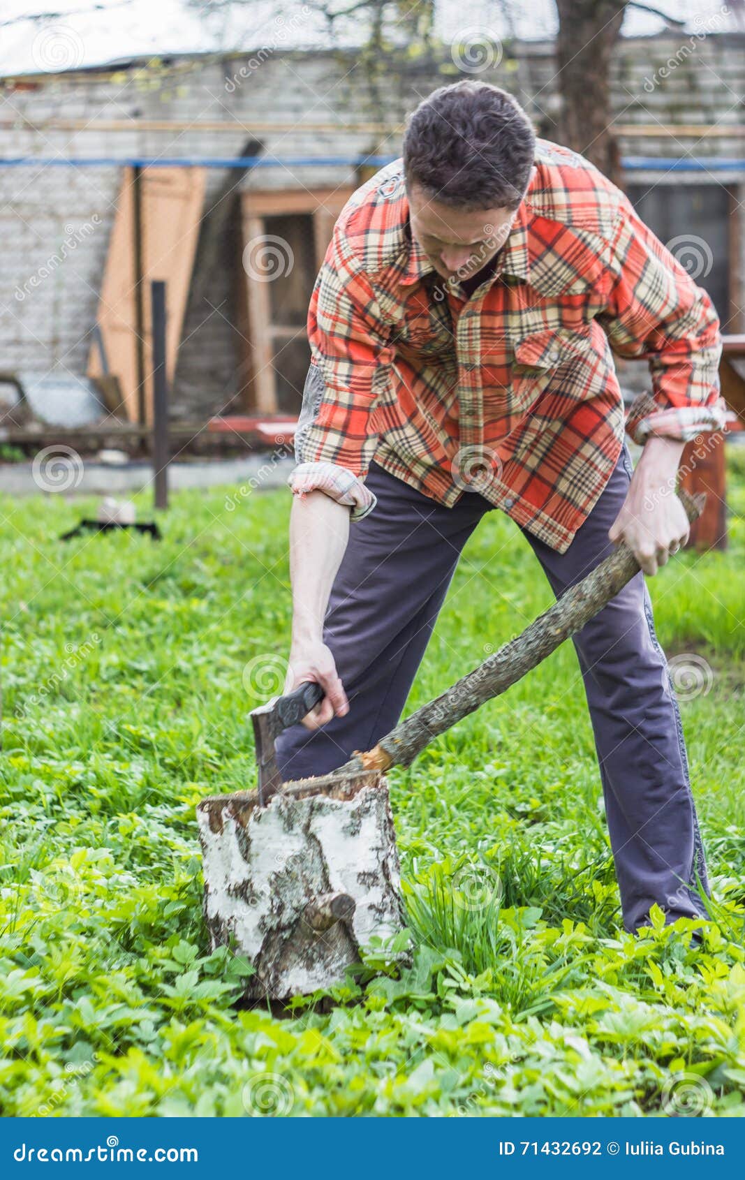Young man chopping wood stock photo. Image of hands, power - 71432692