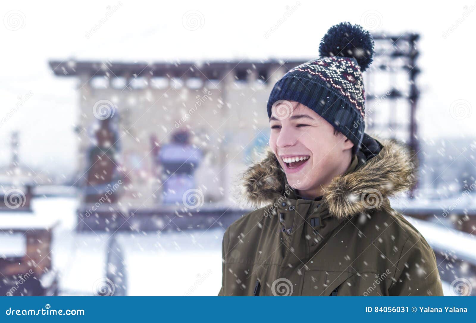 Young Man on a City Street during a Snowfall Stock Image - Image of ...