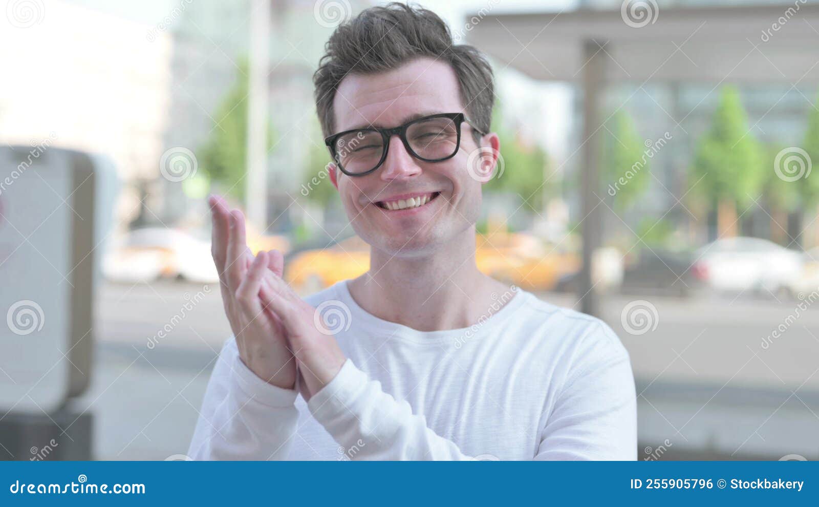 Young Man Clapping in Appreciation Outdoor Stock Photo - Image of ...