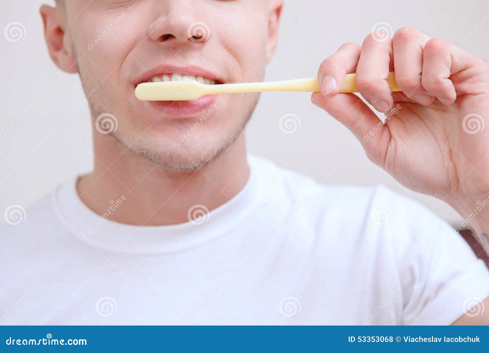 Young Man Cleaning His Teeth Stock Photo - Image of hotel, selective ...