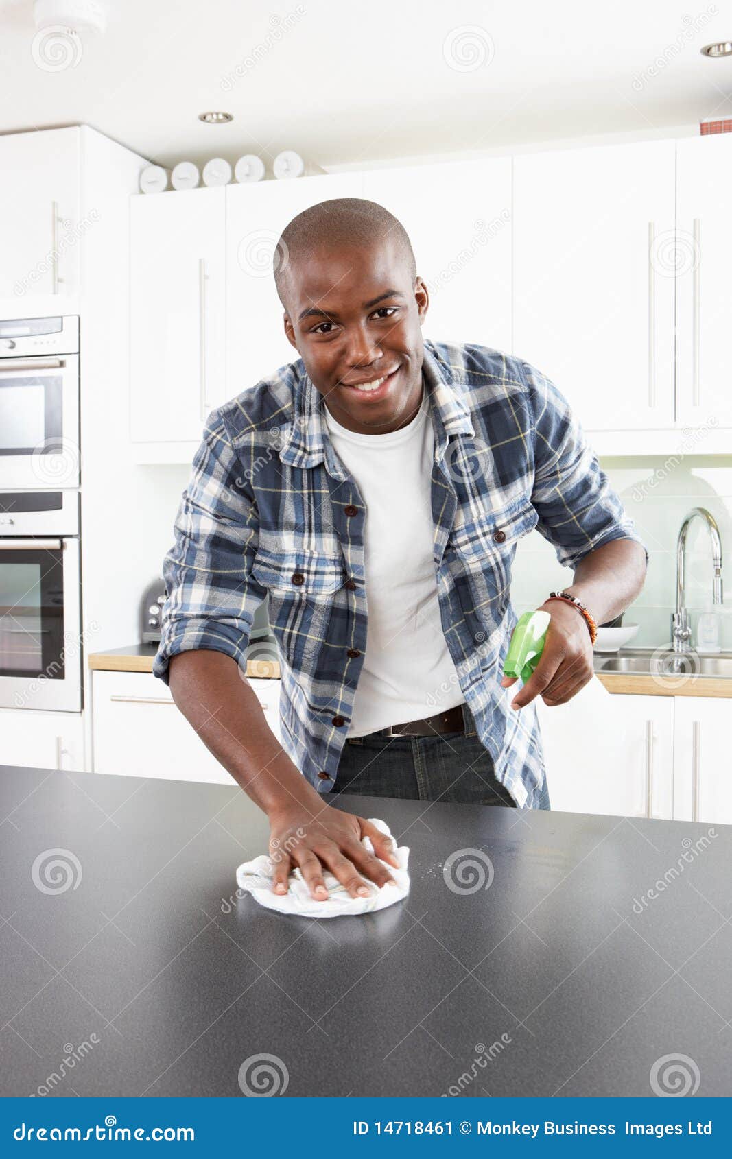 Young Man Cleaning Modern Kitchen Stock Image - Image of american ...