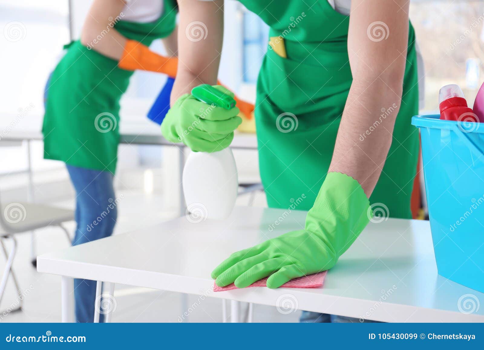 Young Man Cleaning Office Table Stock Image - Image of apron, cleaner ...