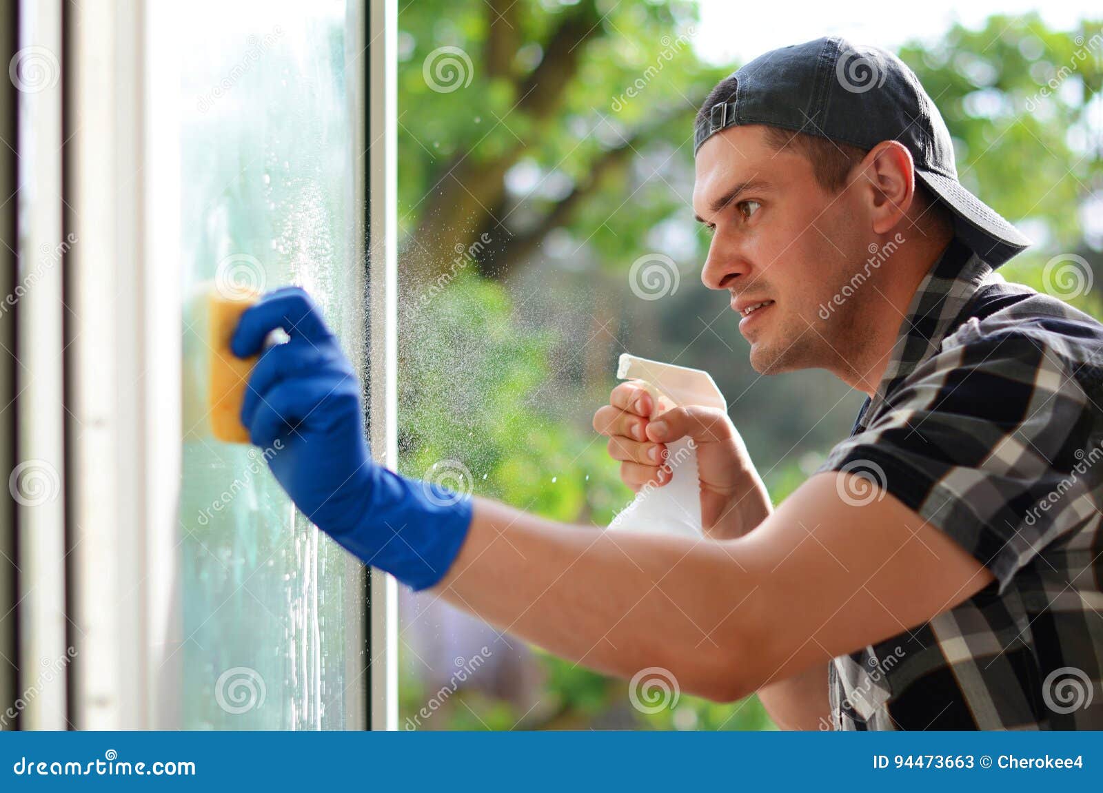 Young Man Cleaning Windows. Window Washer. Stock Image - Image of ...