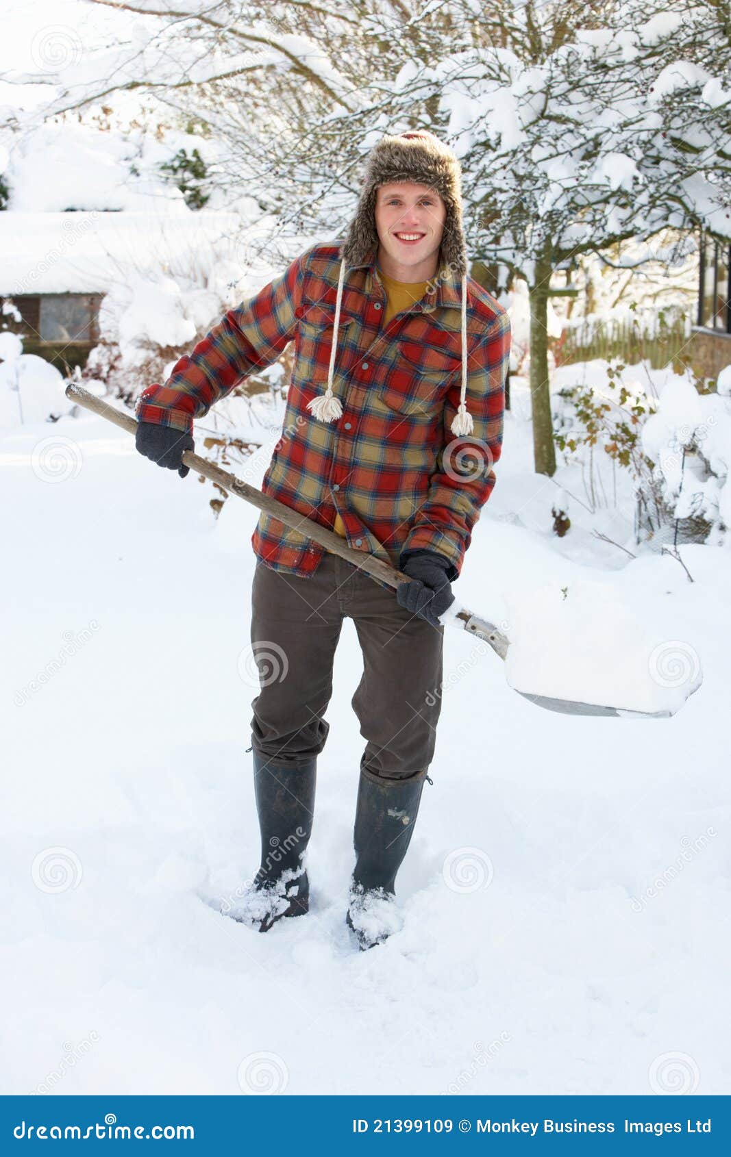 Young man clearing snow stock image. Image of people - 21399109 Young man clearing snow stock image. Image of people - 21399109