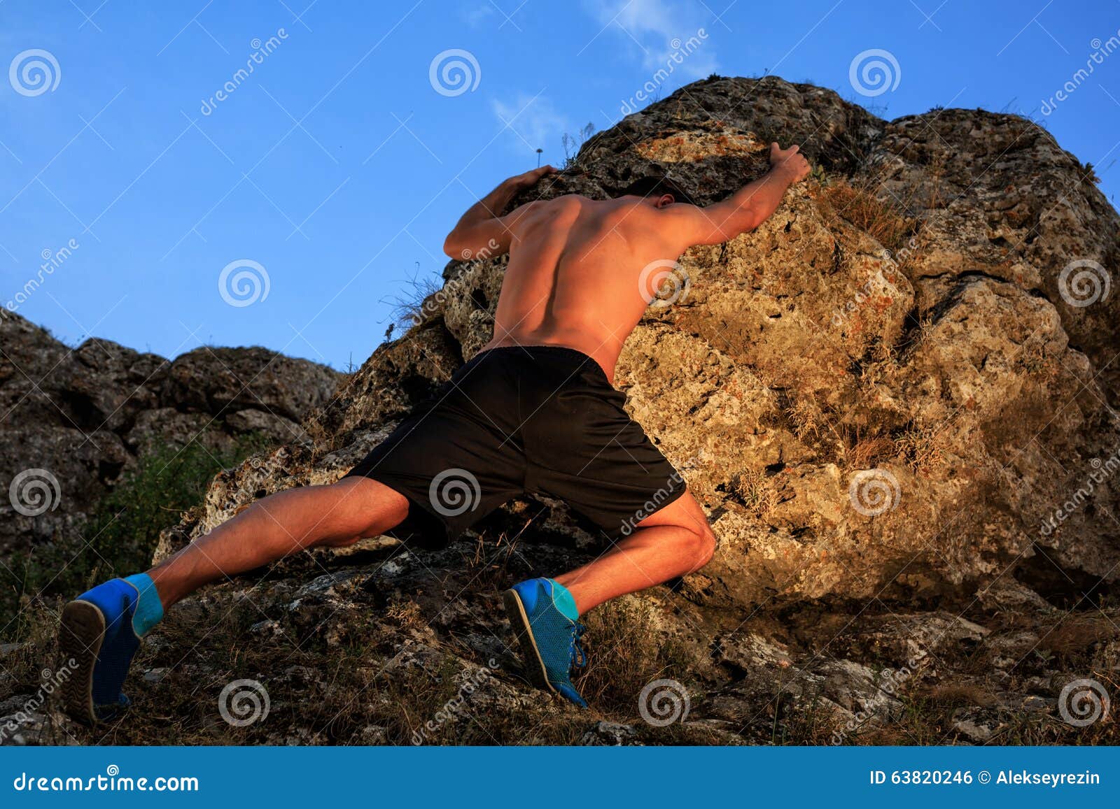 Young Man Climbing the Mountain Ridge Stock Photo - Image of cave ...